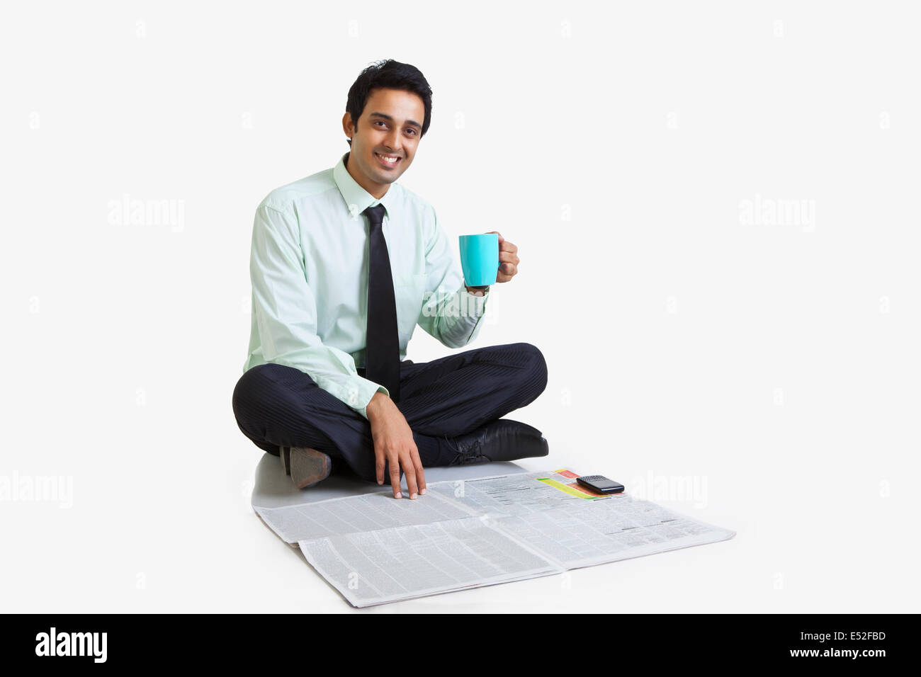 Portrait of business executive with mug of tea Stock Photo - Alamy