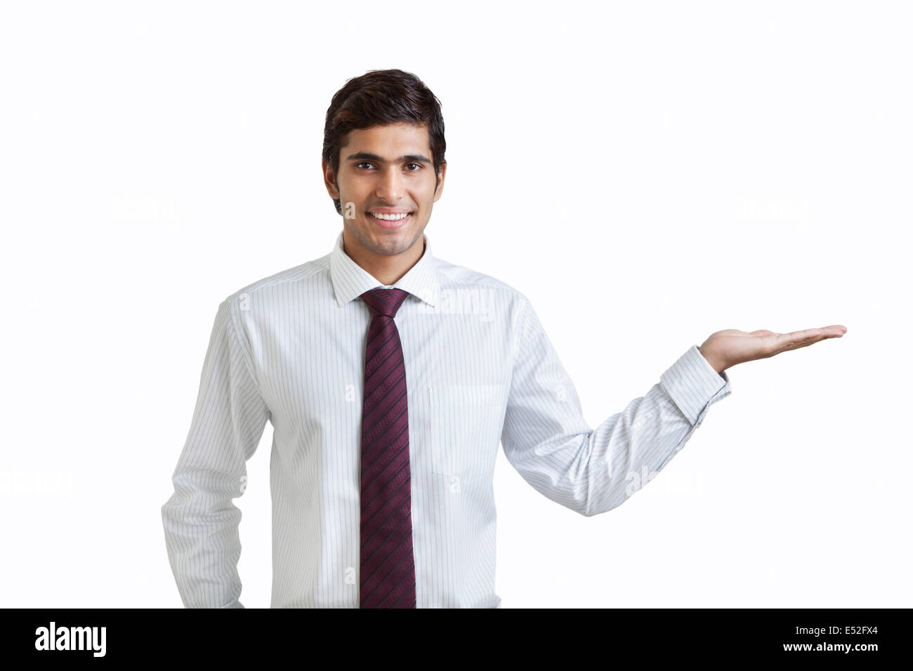 Portrait of business executive with extended hand Stock Photo - Alamy