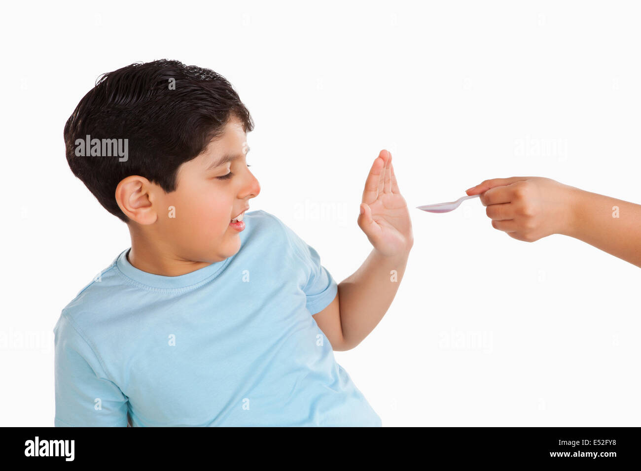 Little boy refusing to take medicine Stock Photo - Alamy