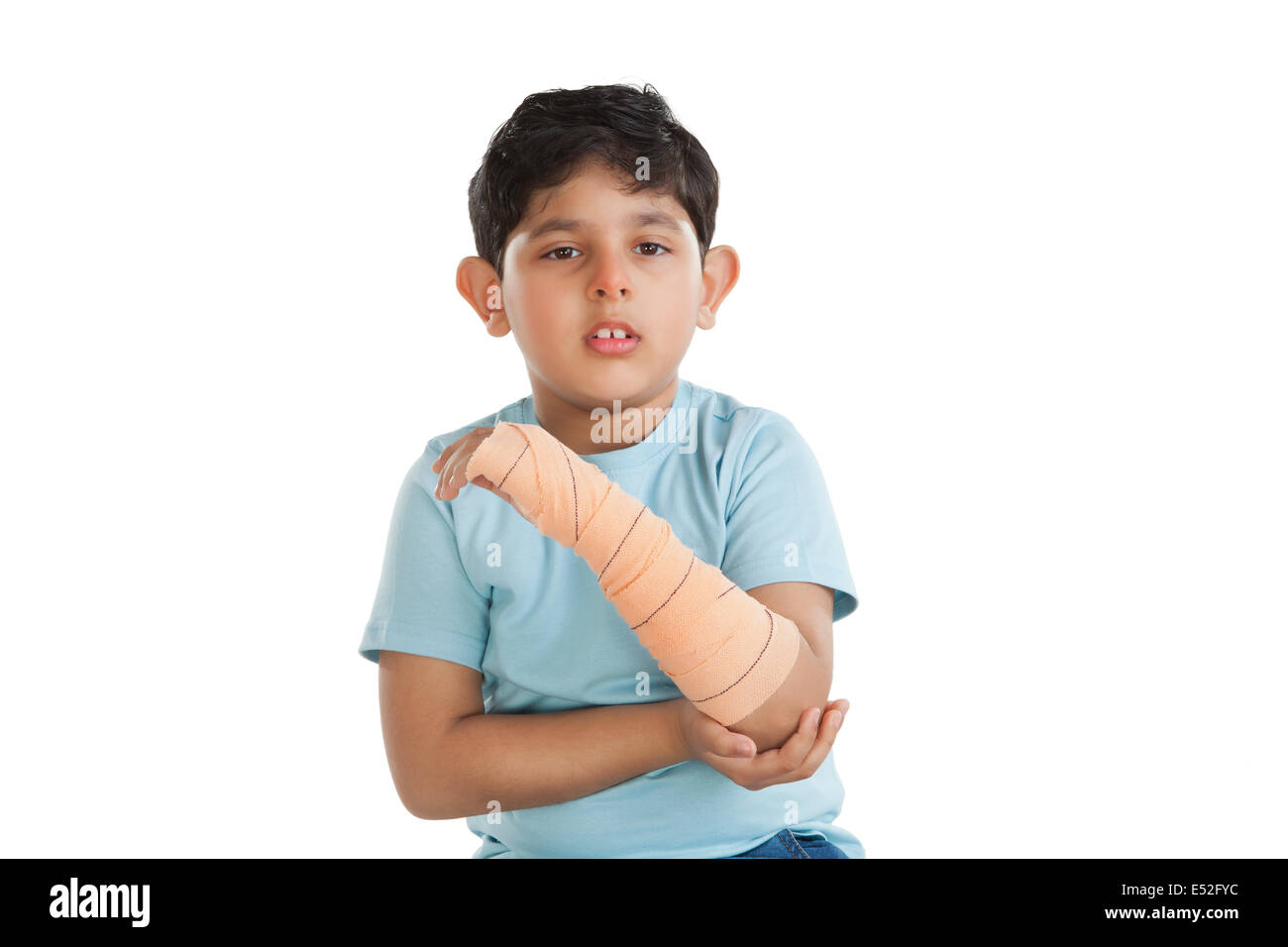 Portrait of little boy with injured arm Stock Photo - Alamy