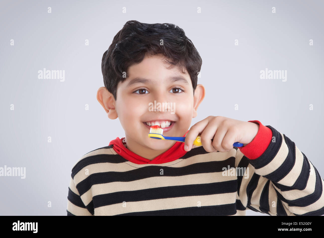 Little boy brushing his teeth Stock Photo - Alamy