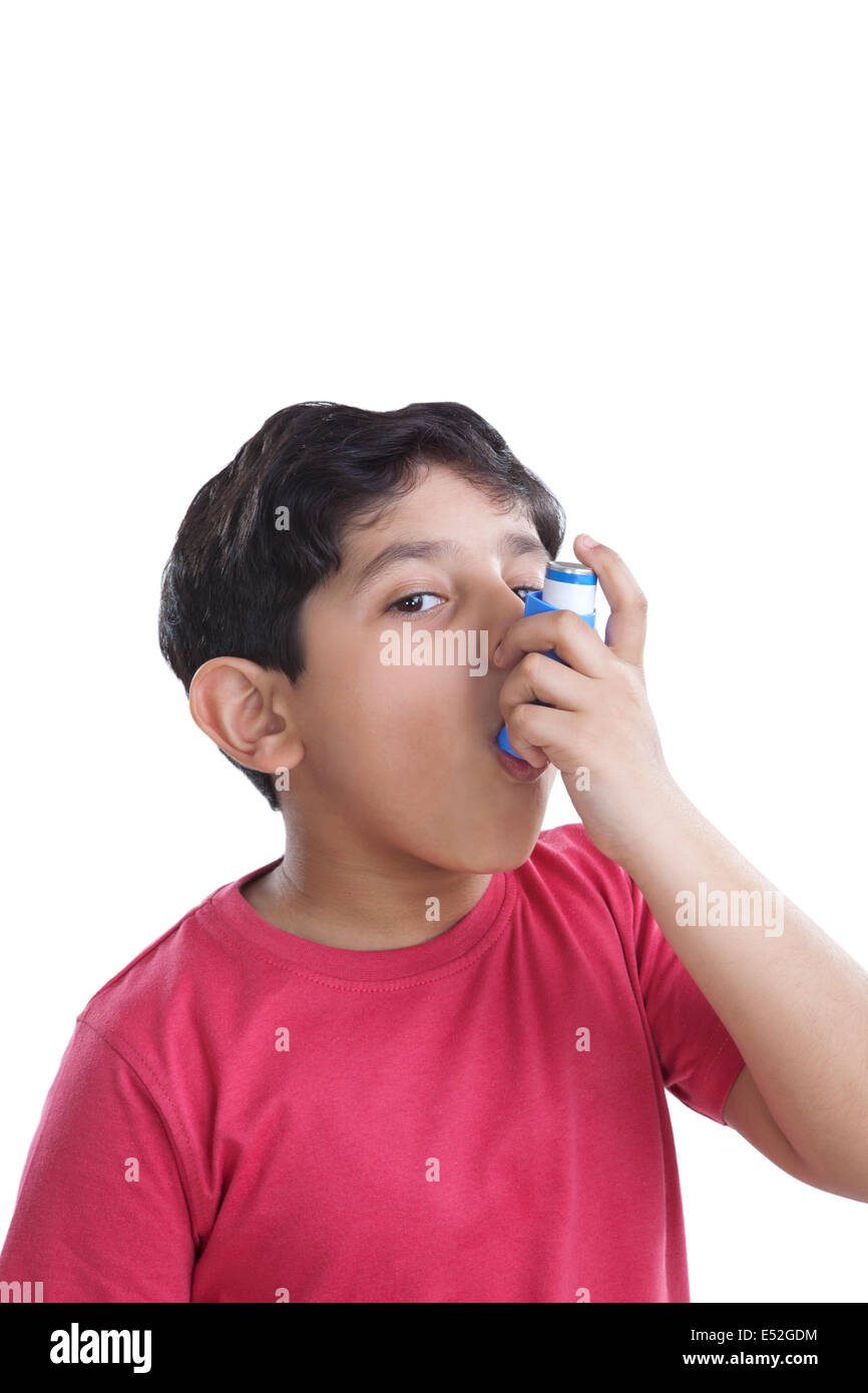 Portrait of little boy using an inhaler Stock Photo - Alamy