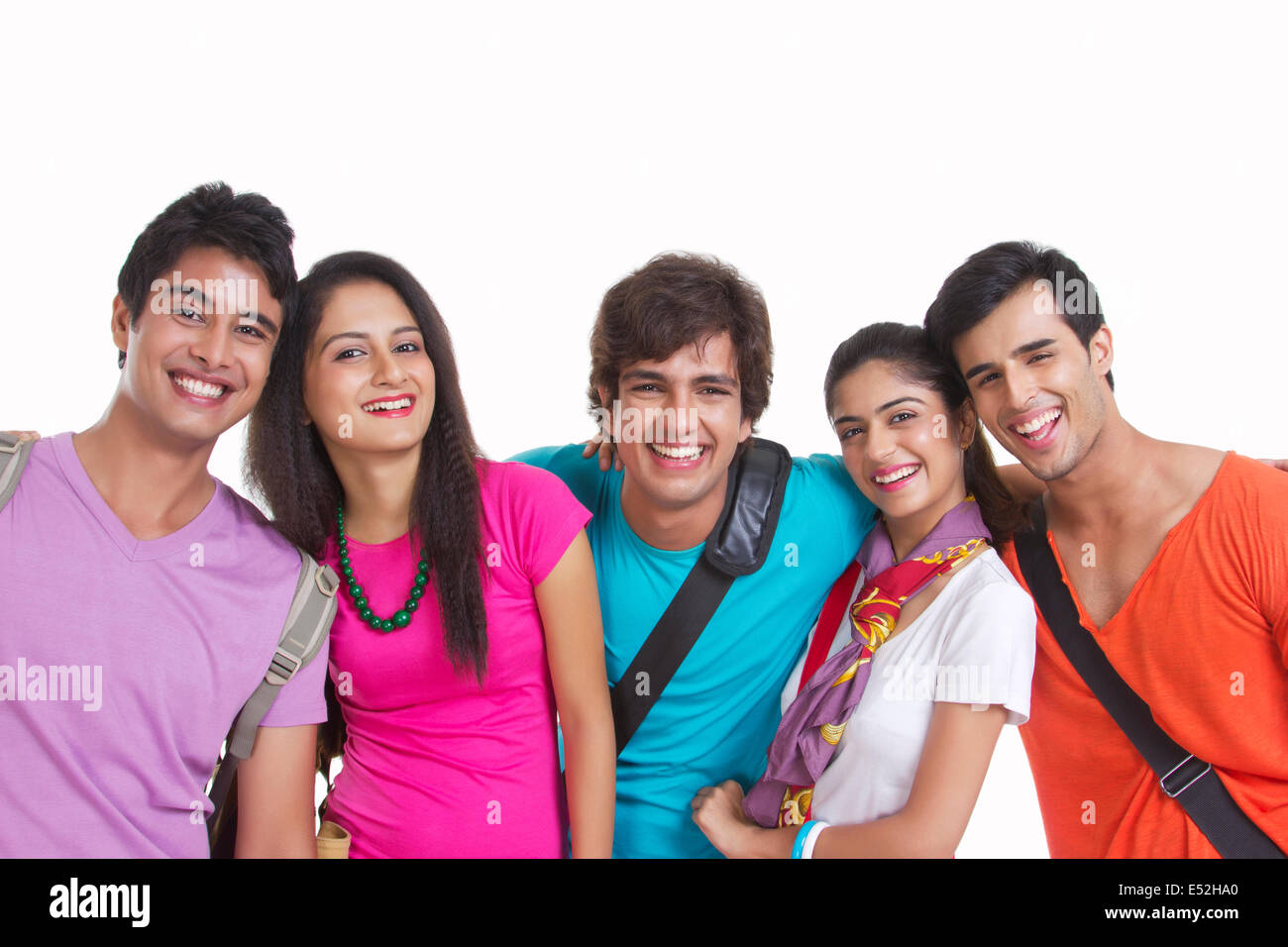 Portrait of university students smiling together on white background ...