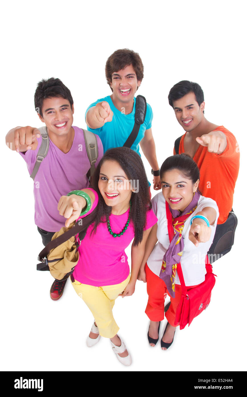 High angle portrait of university students pointing at you over white ...