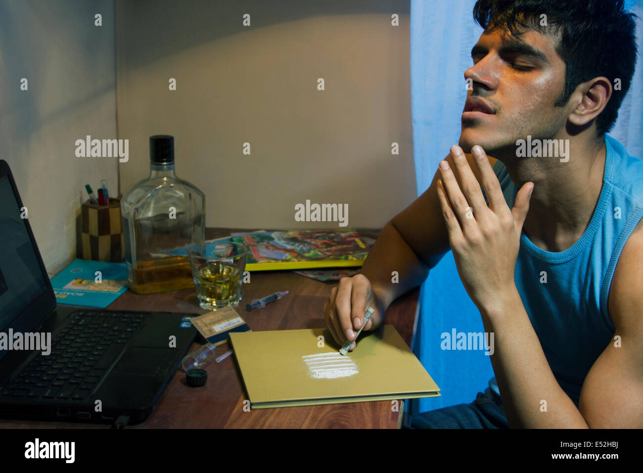 Male drug addict with cocaine at home Stock Photo - Alamy