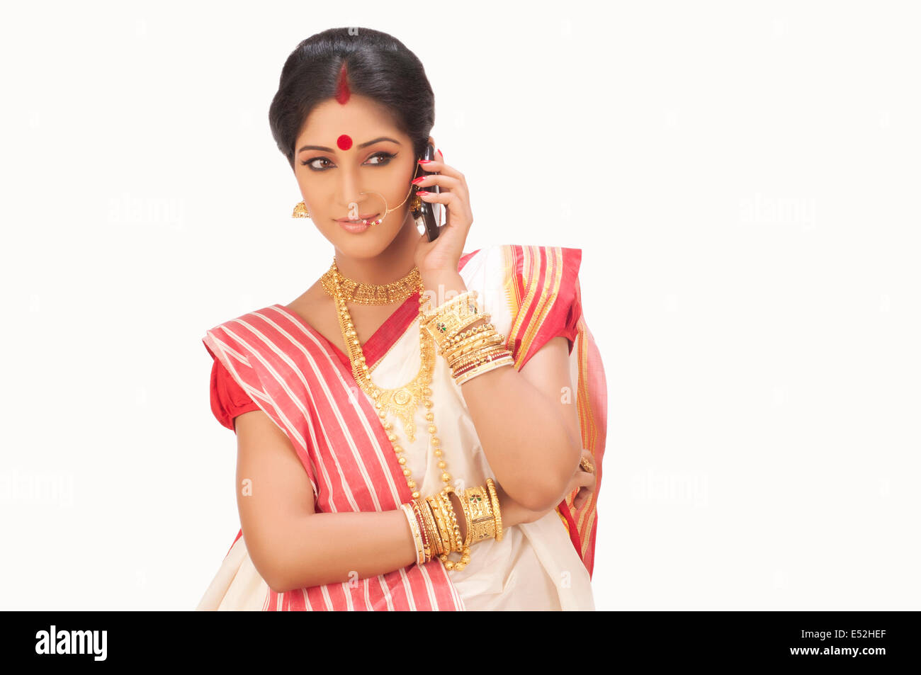 Bengali woman talking on a mobile phone Stock Photo - Alamy