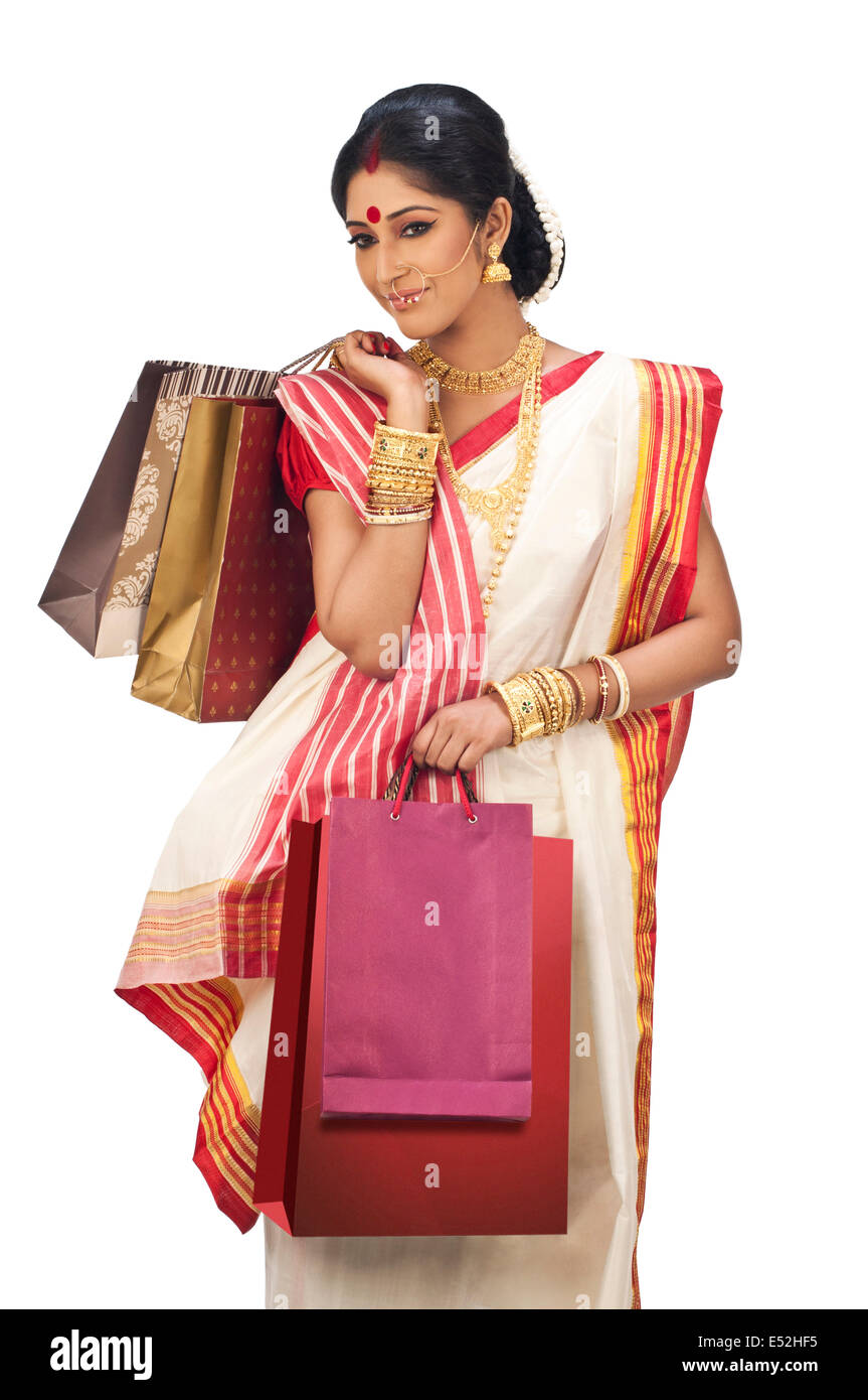 Bengali woman holding shopping bags Stock Photo - Alamy