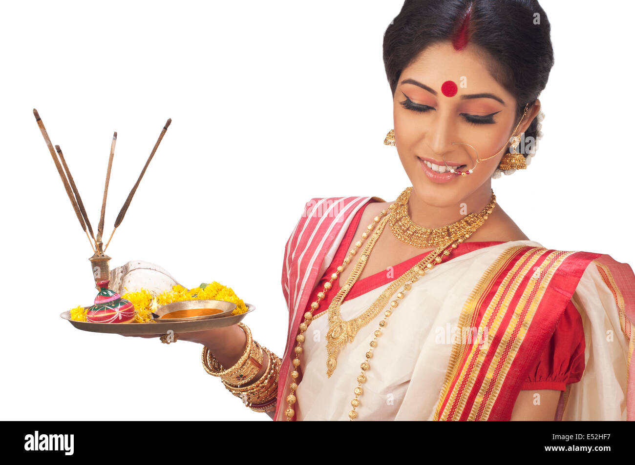 Indian woman holding pooja thali hi-res stock photography and images ...