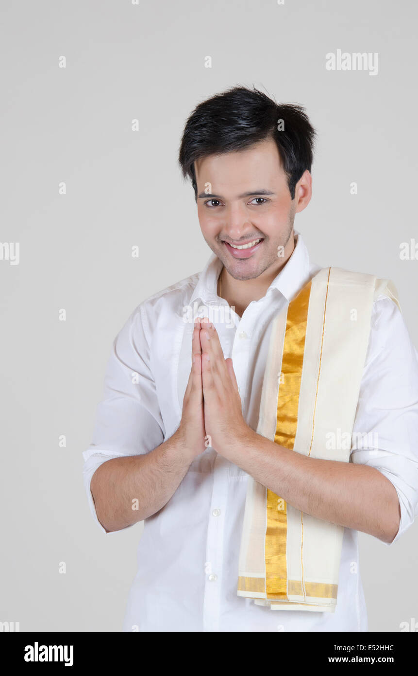 Portrait of South Indian man greeting Stock Photo - Alamy