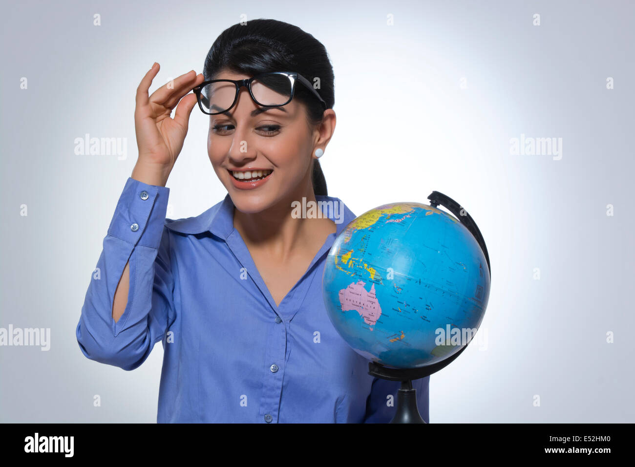 Looking over glasses hi-res stock photography and images - Alamy