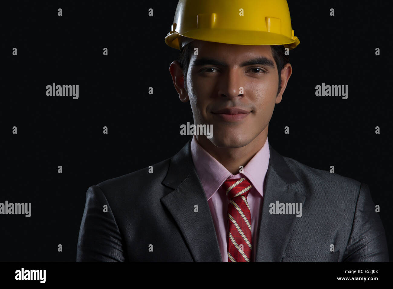 Young adult wearing hardhat hi-res stock photography and images - Alamy