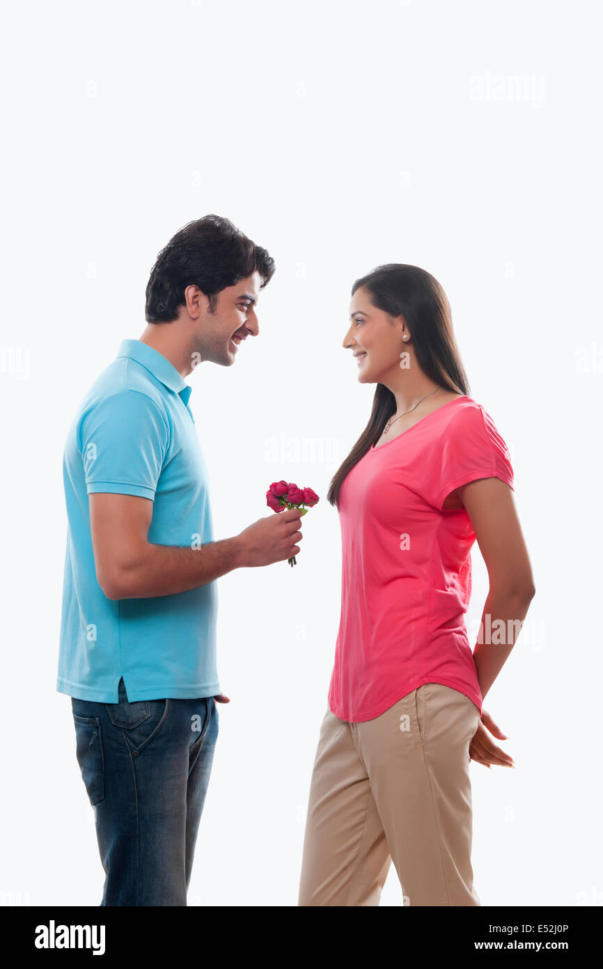 Man giving rose to woman hi-res stock photography and images - Alamy