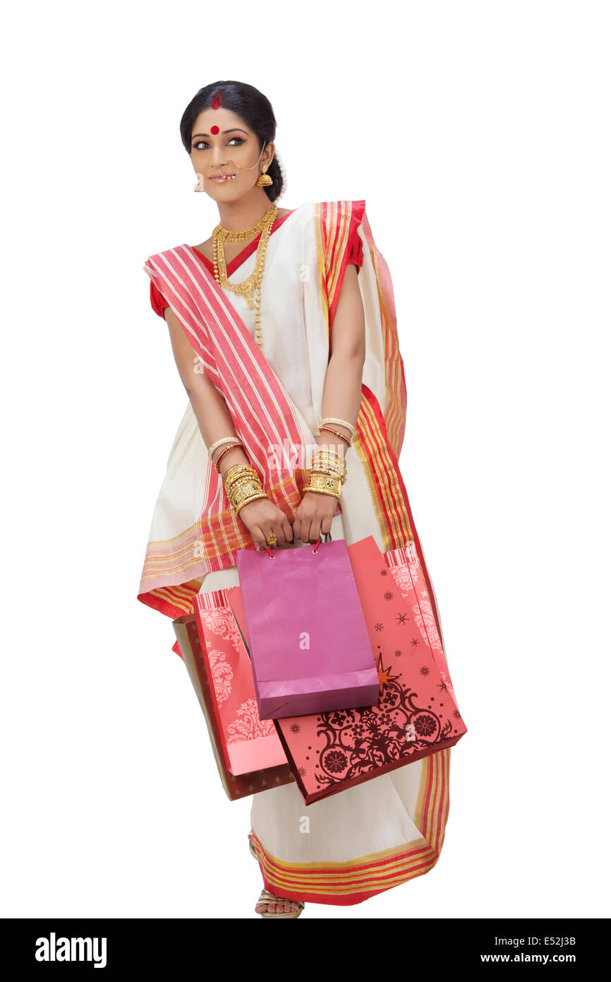 Bengali woman carrying shopping bags hi-res stock photography and ...