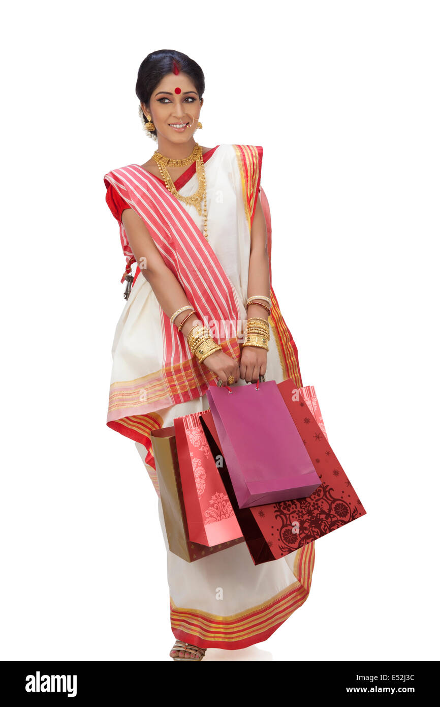 Bengali woman carrying shopping bags Stock Photo - Alamy