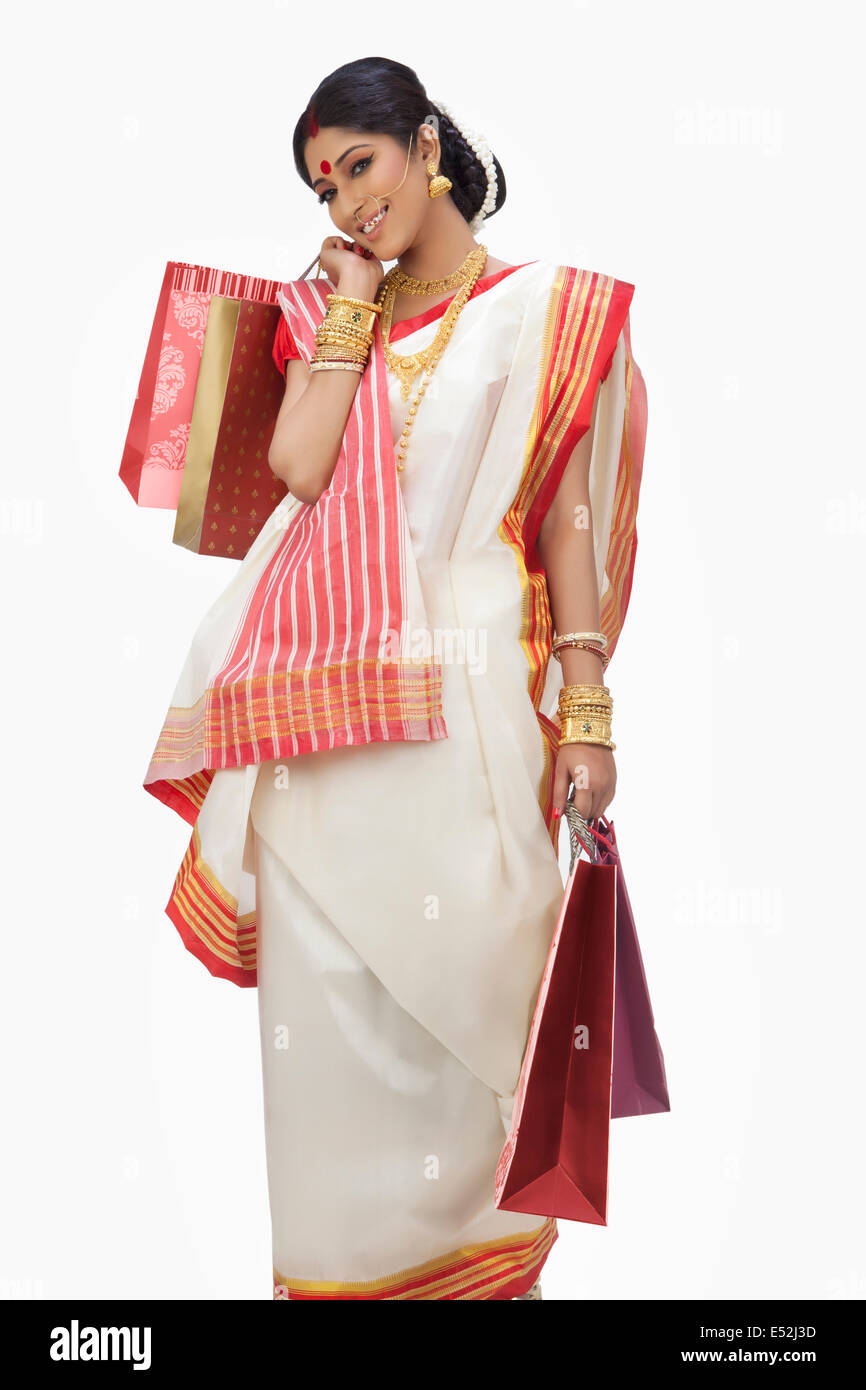 Portrait of Bengali woman carrying shopping bags Stock Photo - Alamy