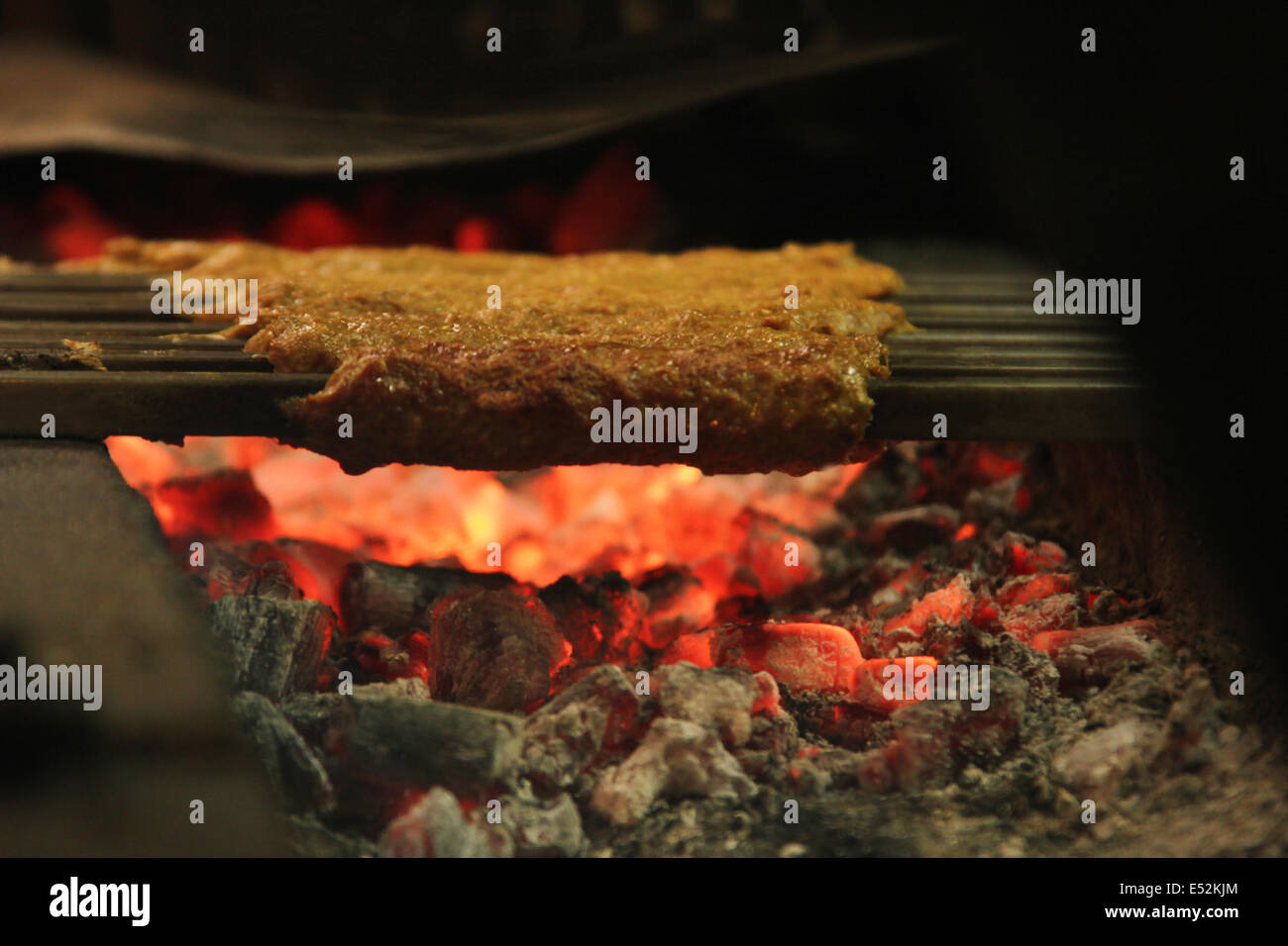 Minced meat being barbecued Stock Photo - Alamy
