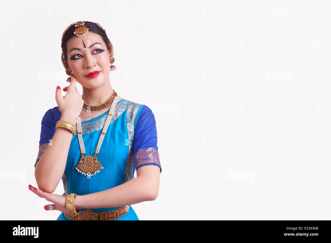 Bharata Natyam dancer performing over white background Stock Photo - Alamy
