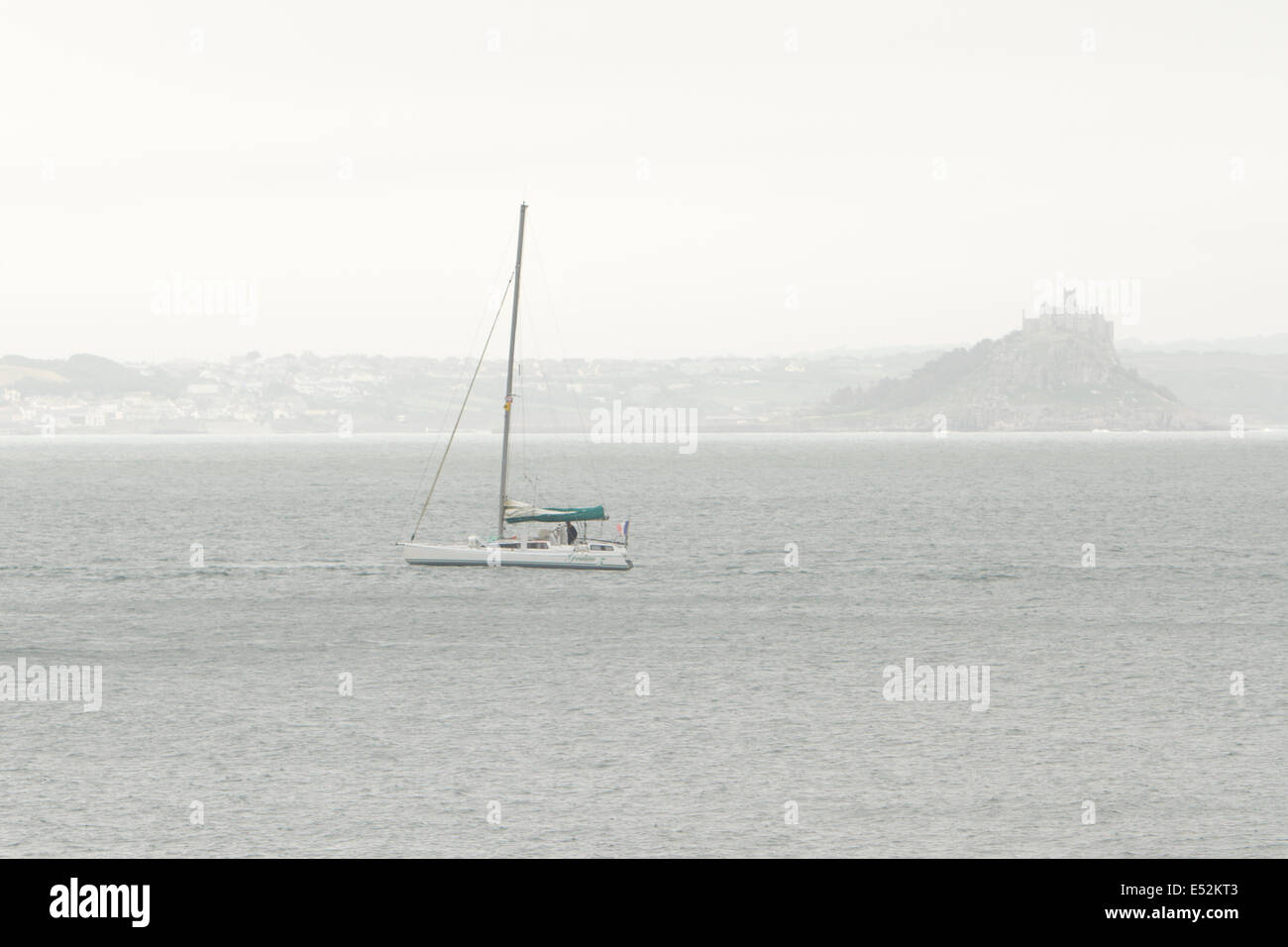 Newlyn, UK. 18th July, 2014. The Penlee RNLI Lifeboat tows a 30 foot ...
