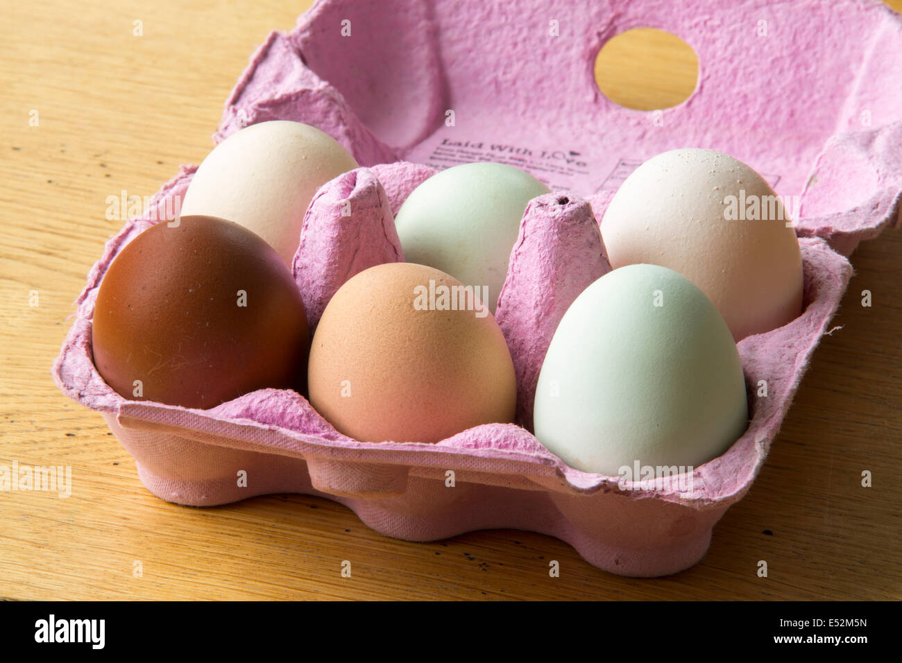 Free range eggs from happy chickens of different breeds Stock Photo - Alamy