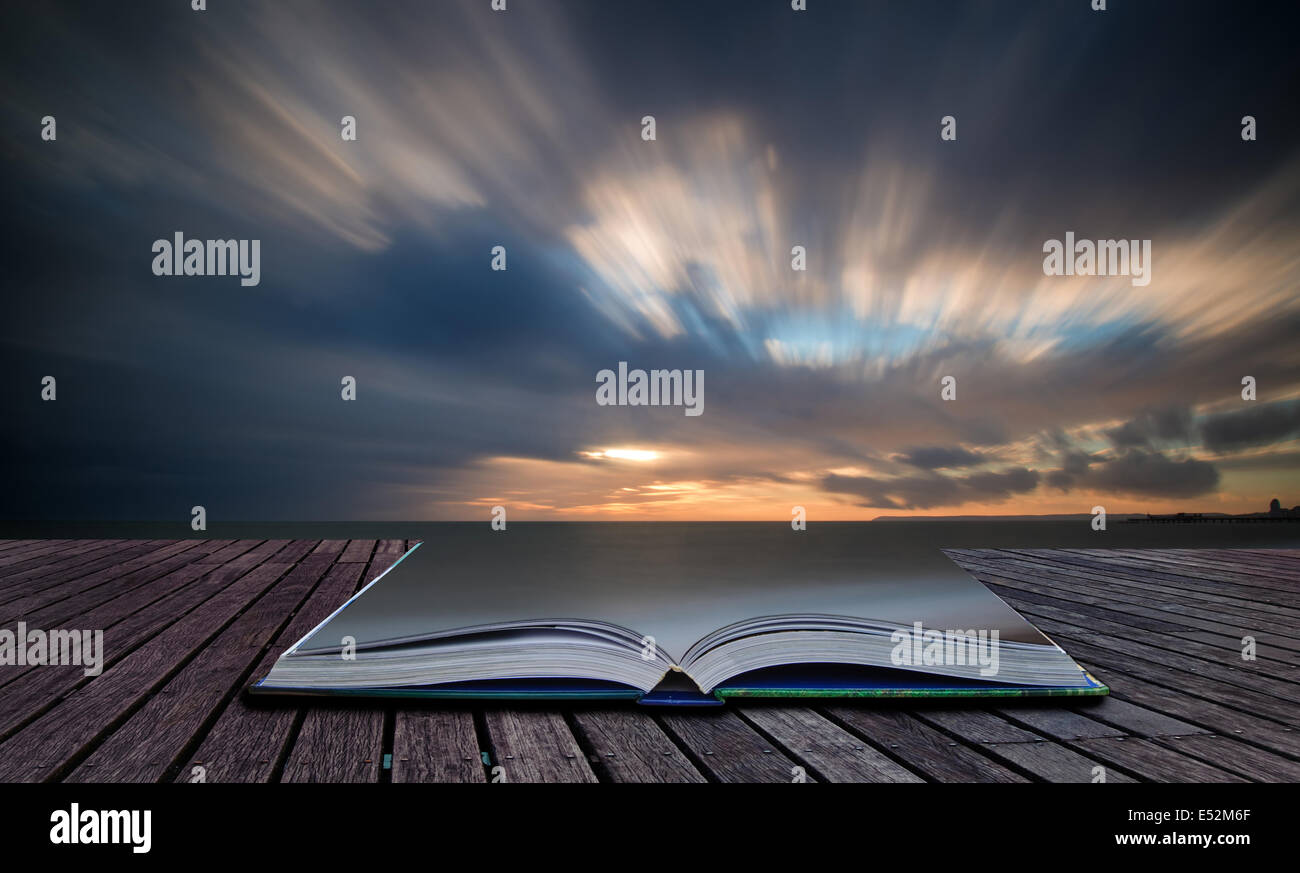 Book concept Stunning long exposure landscape image of sunset over sea ...