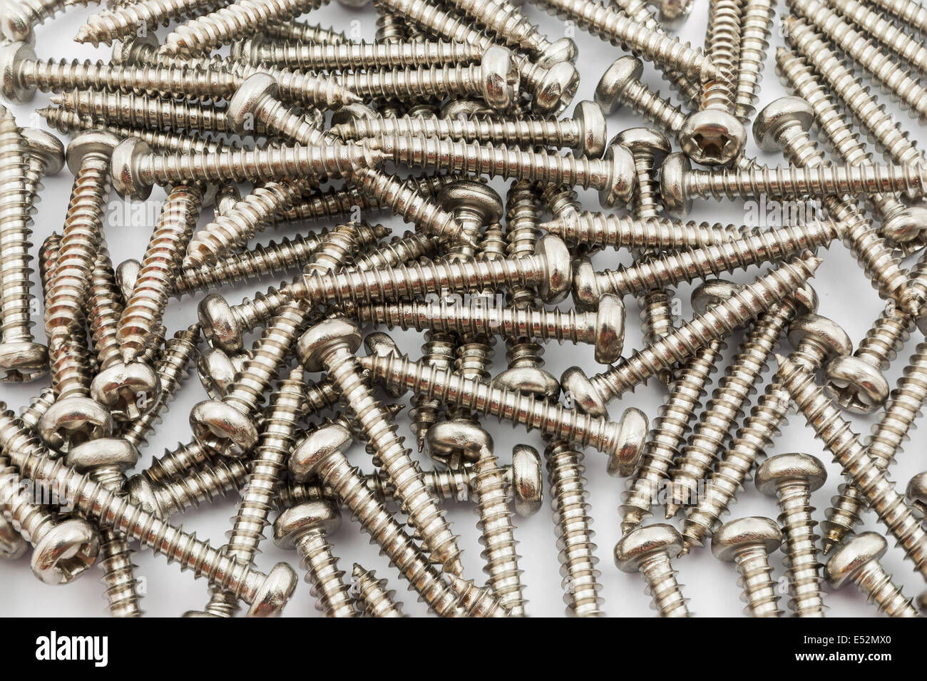 Stainless Steel Screws Background/ Texture Stock Photo - Alamy