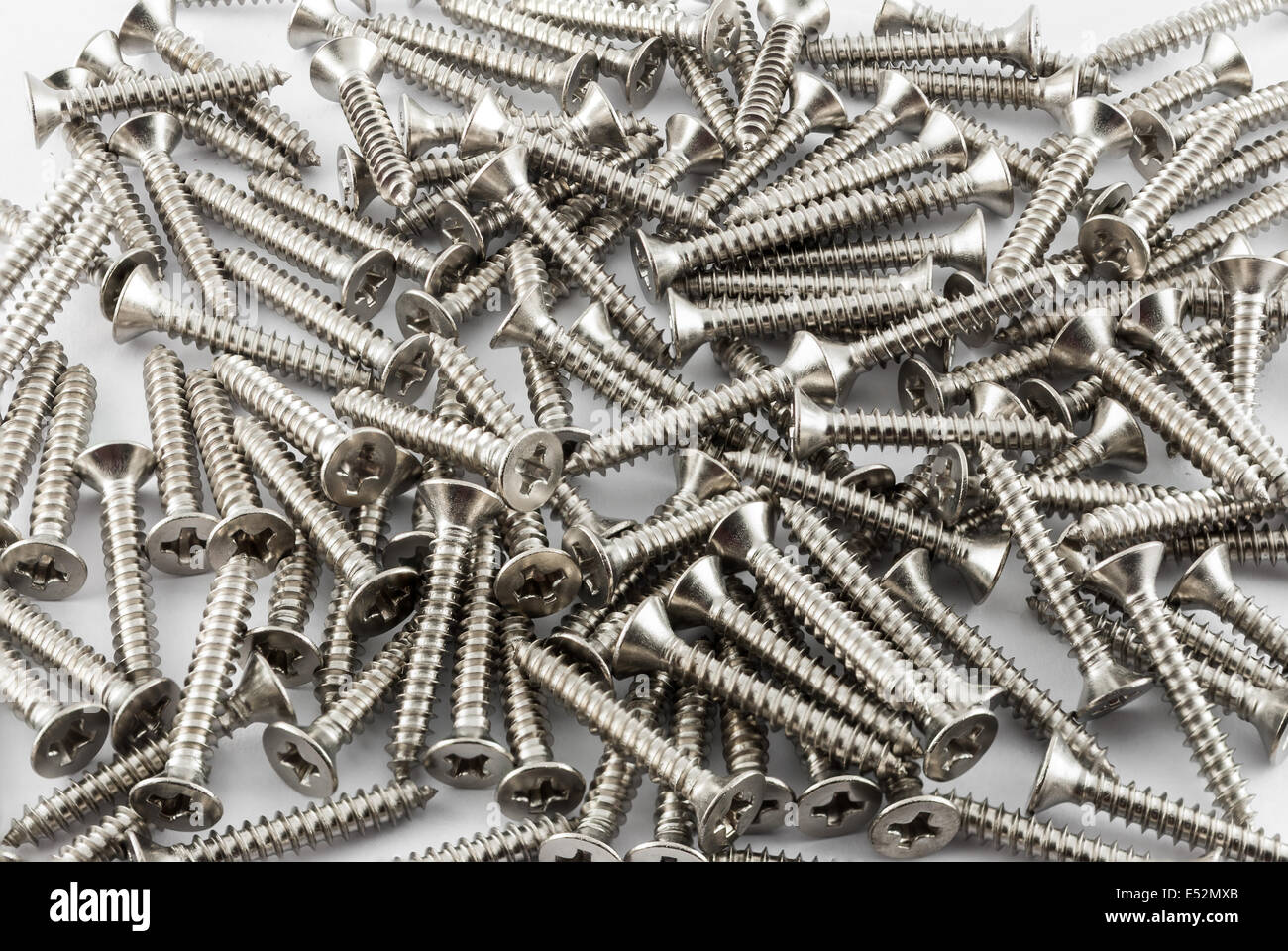 Stainless Steel Screws Background/ Texture Stock Photo - Alamy