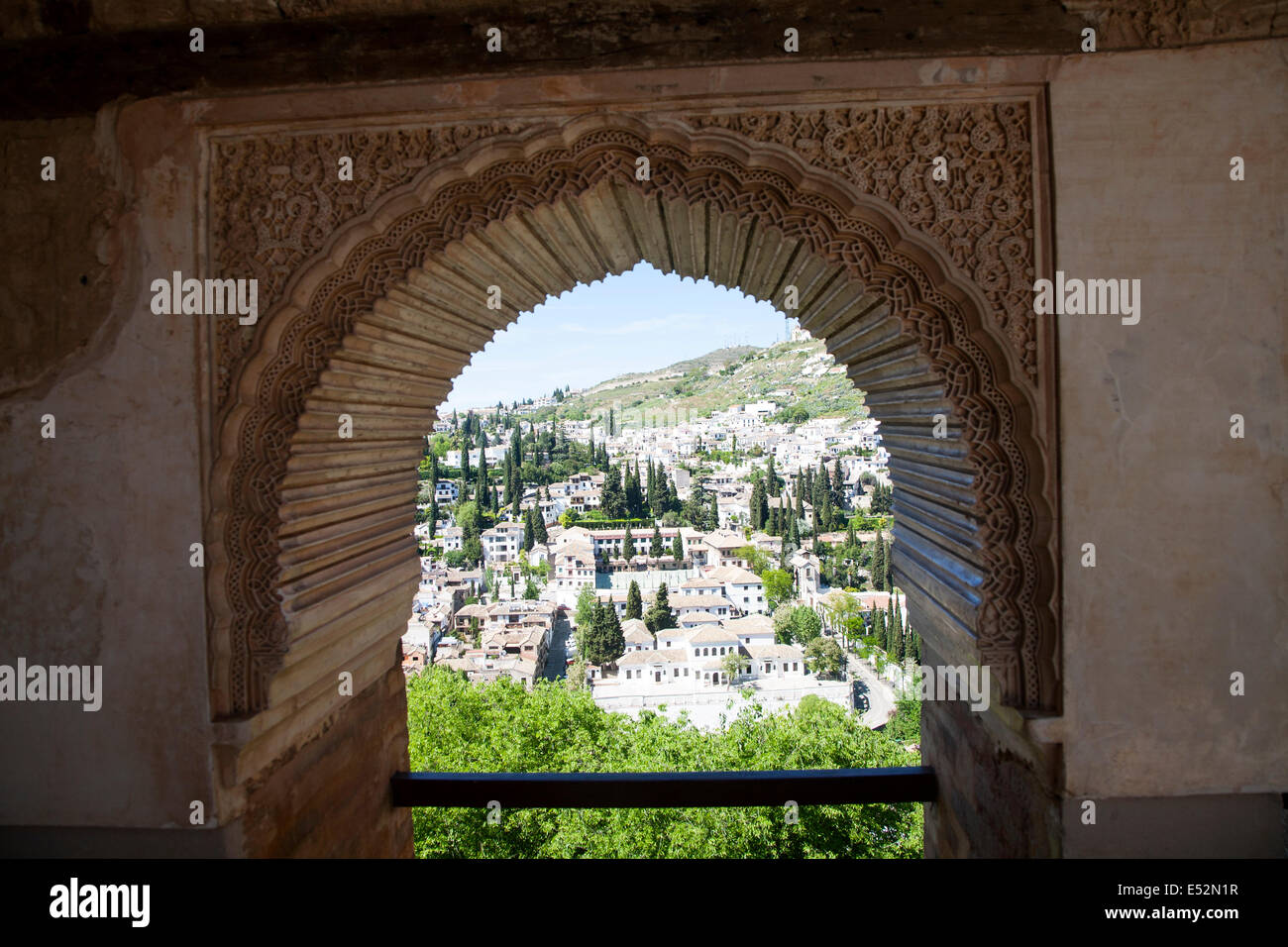 View through Alhambra window archway to Moorish houses in the Albaicin ...