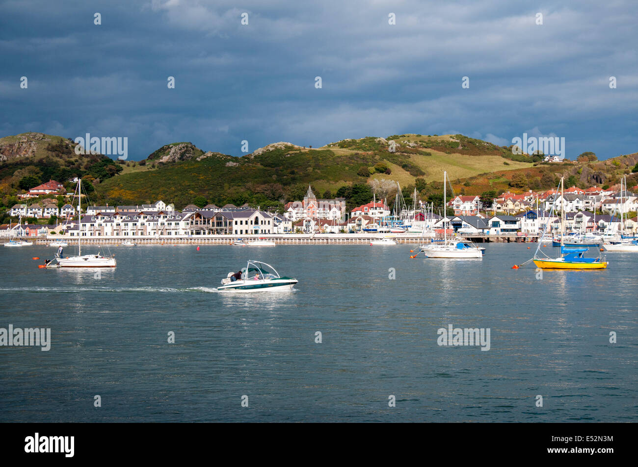 Stormy light in the harbour at Conwy, North Wales UK Stock Photo - Alamy