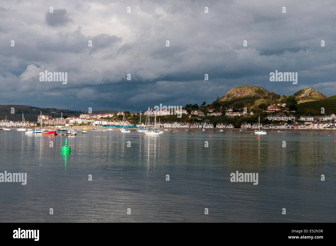 Stormy light in the harbour at Conwy, North Wales UK Stock Photo - Alamy