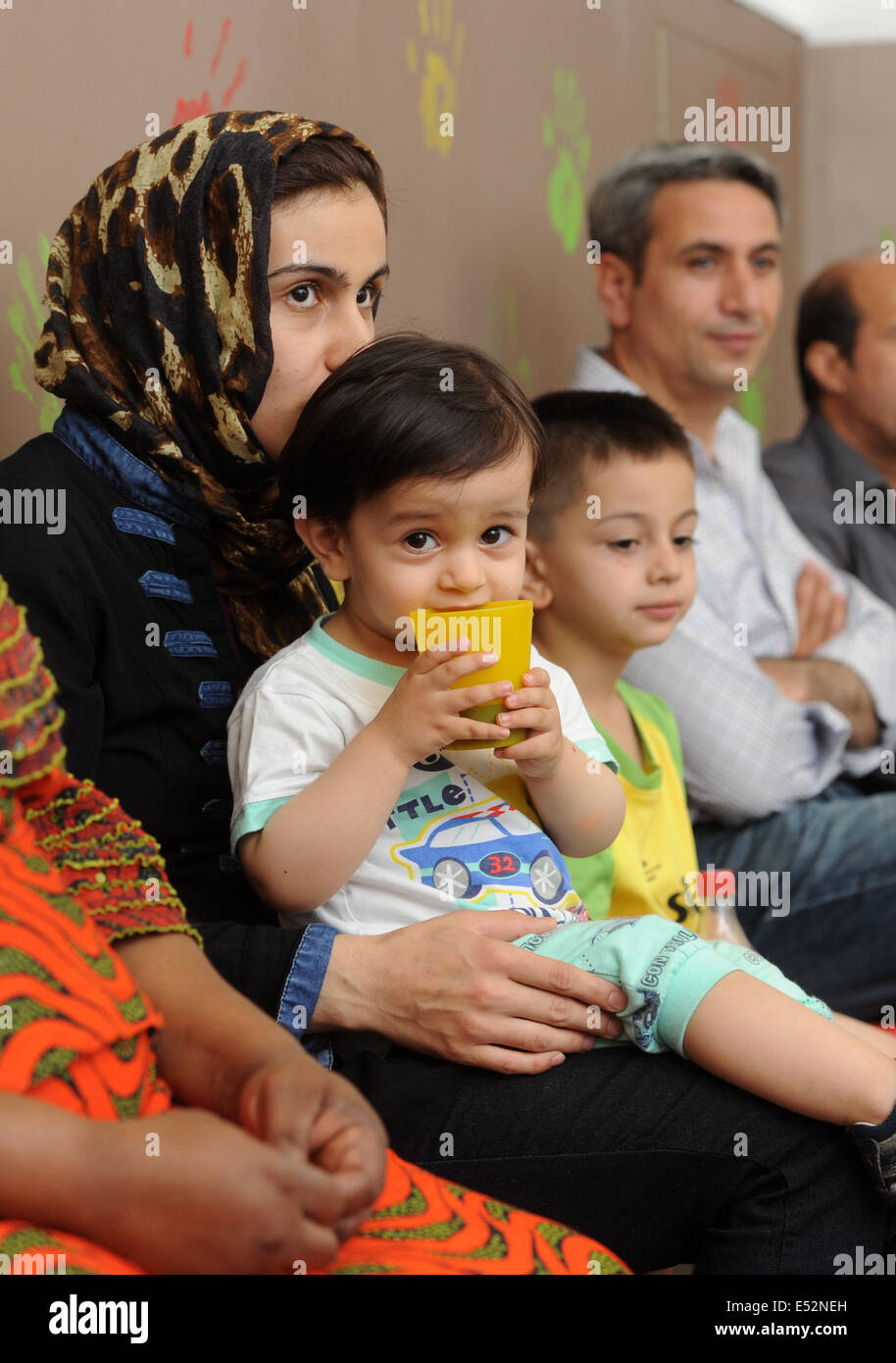 Munich, Germany. 18th July, 2014. Afghan refugee children Nakif (2-L-R ...