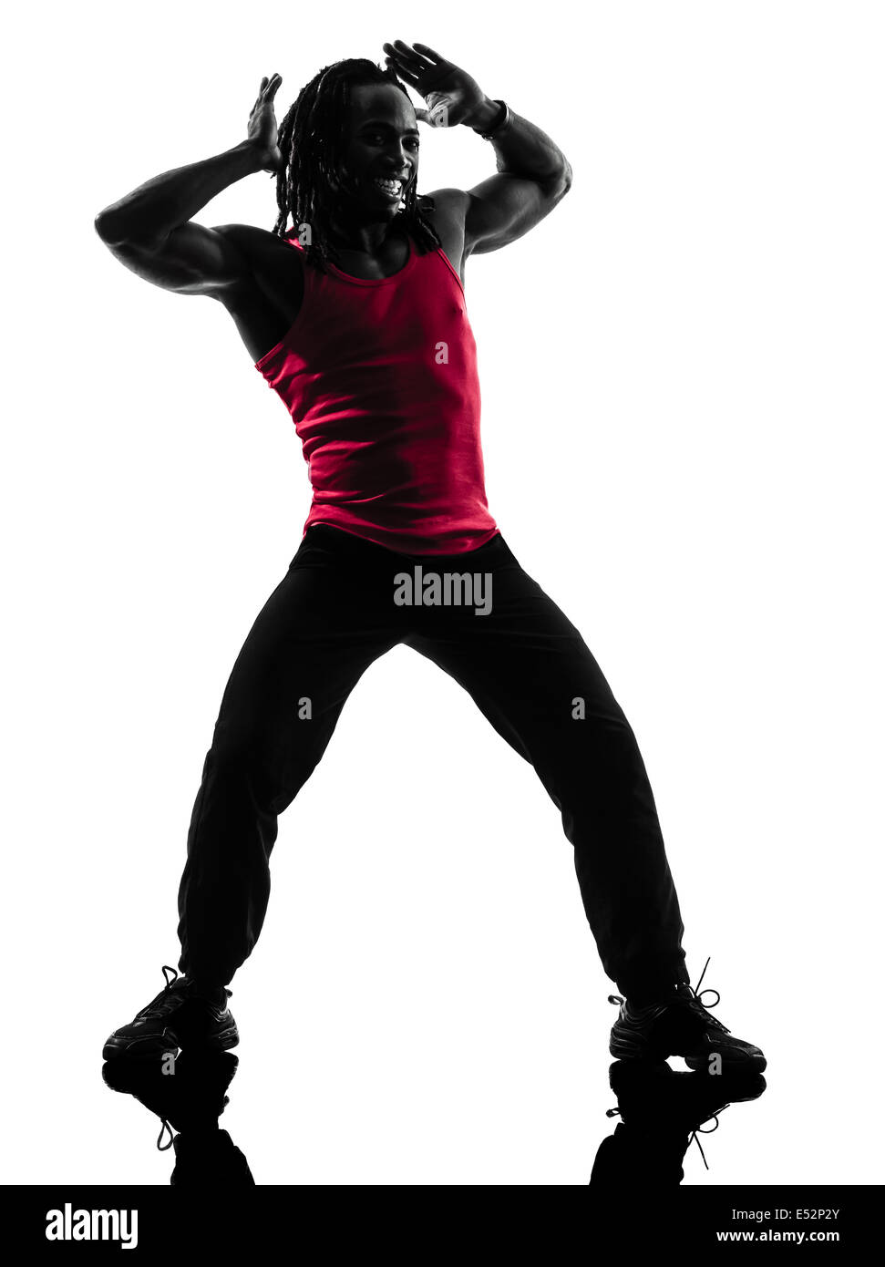 one african man exercising fitness zumba dancing in silhouette on white ...