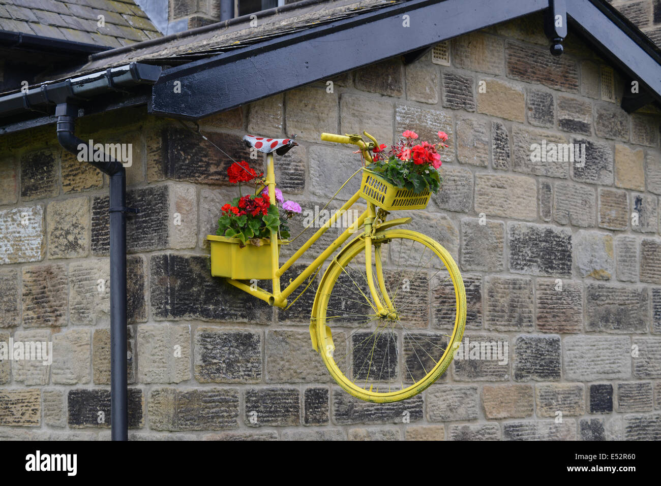bike on side of cottage by the route of the tour de france welcoming ...