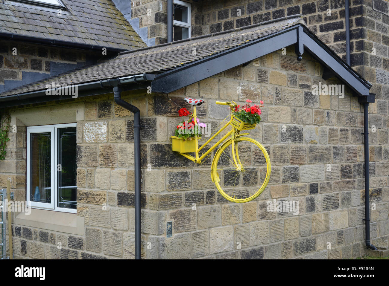 bike on side of cottage by the route of the tour de france welcoming ...