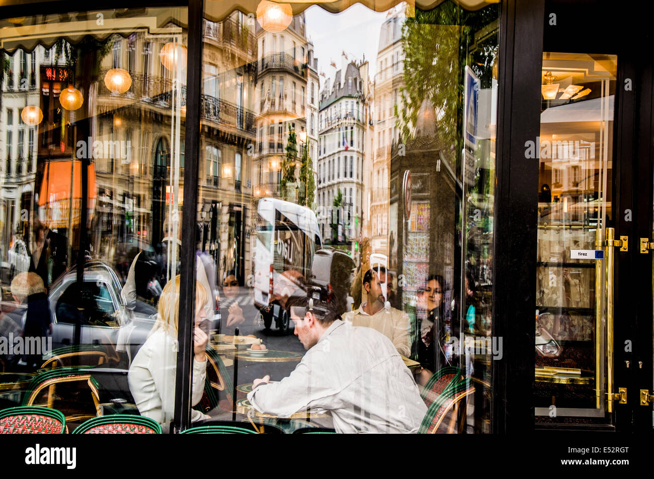 Cafe reflections in Paris France Stock Photo - Alamy