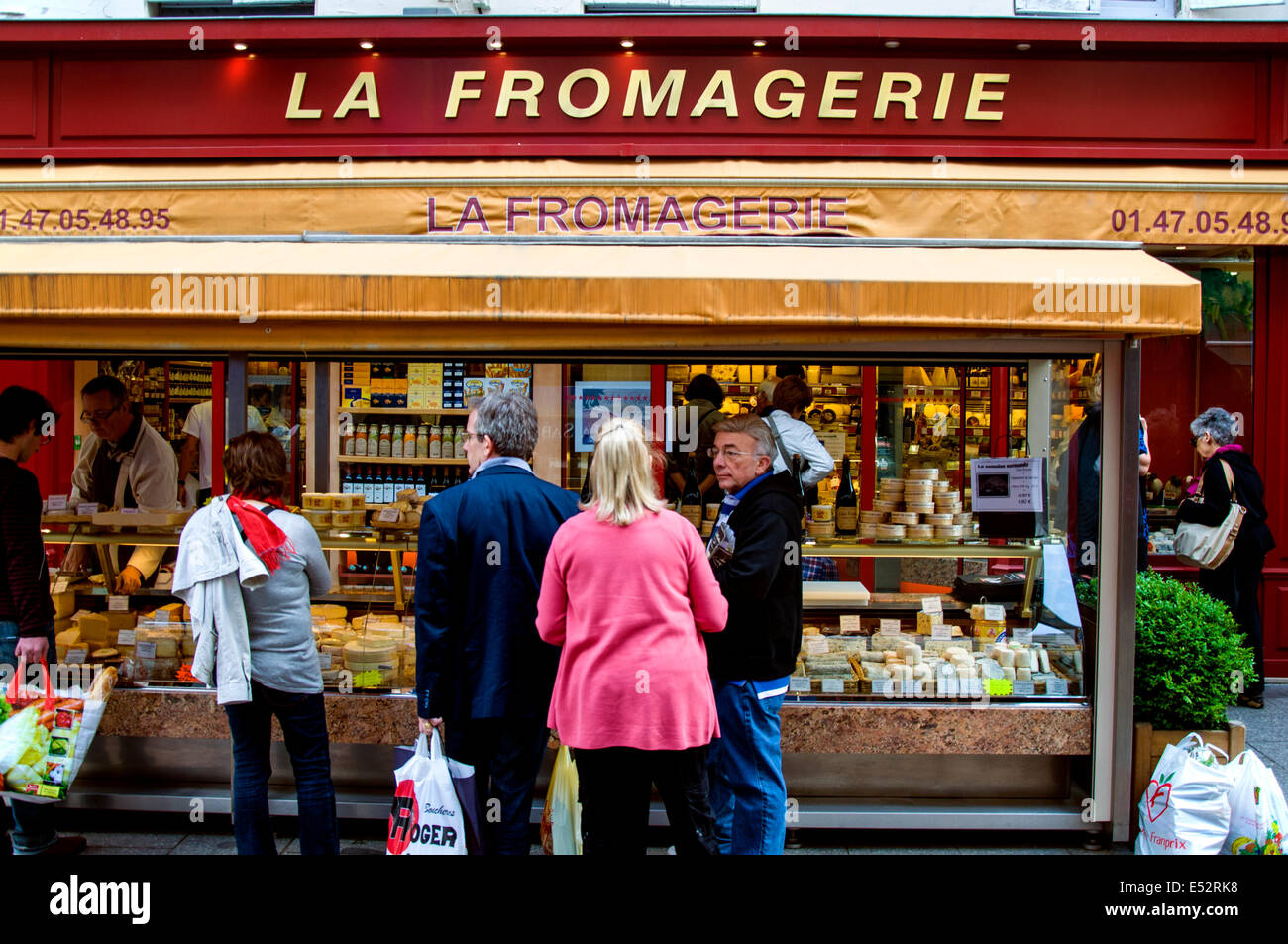 Shopping for cheese at La Fromagerie on Rue Cler 7th arrondissement ...