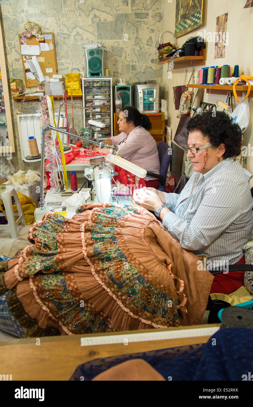 Women sewing dresses for fiesta in Seville Spain Stock Photo - Alamy