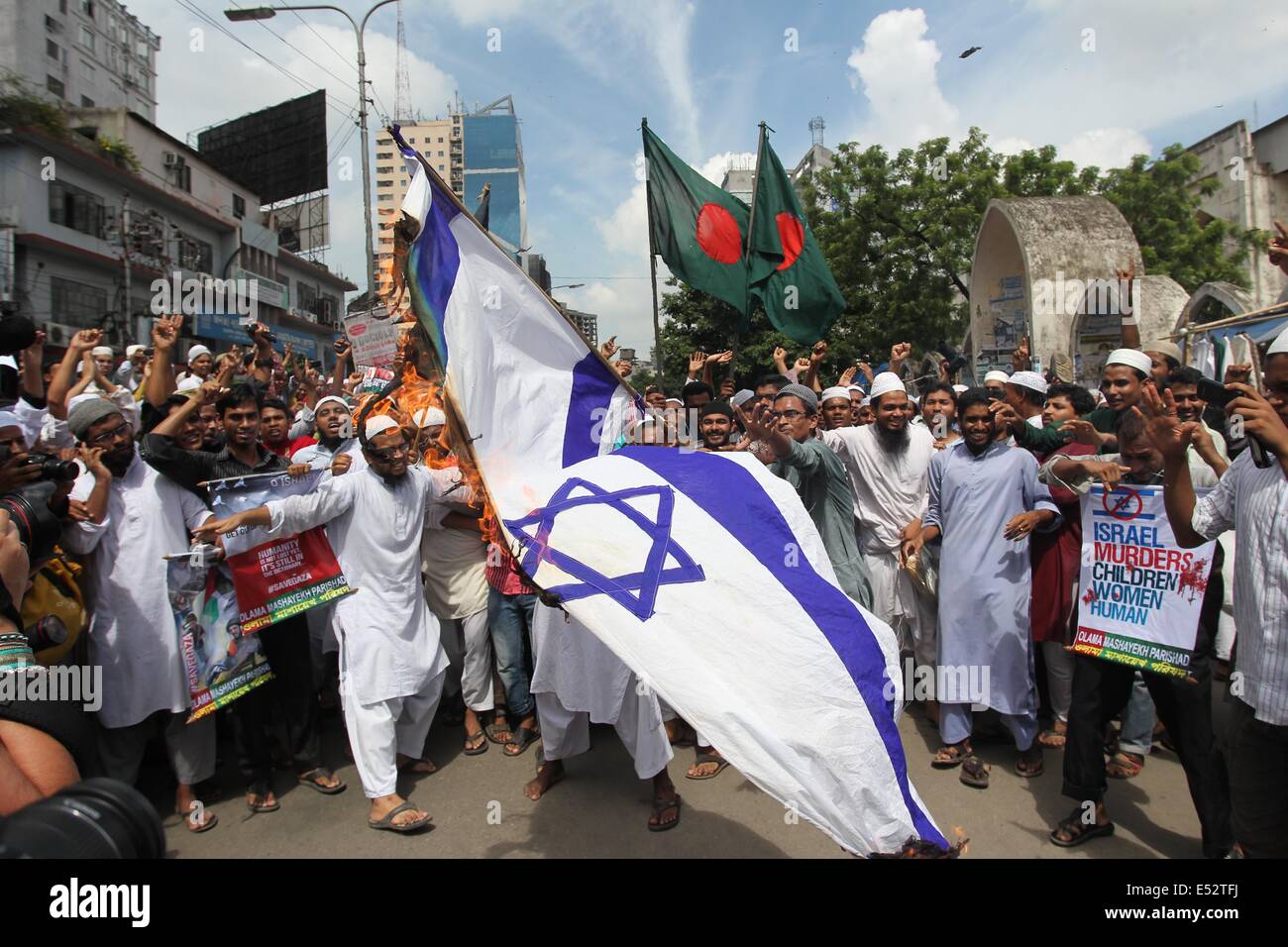 Dhaka, Bangladesh. 18th July, 2014. Bangladeshis burn an Israeli flag ...