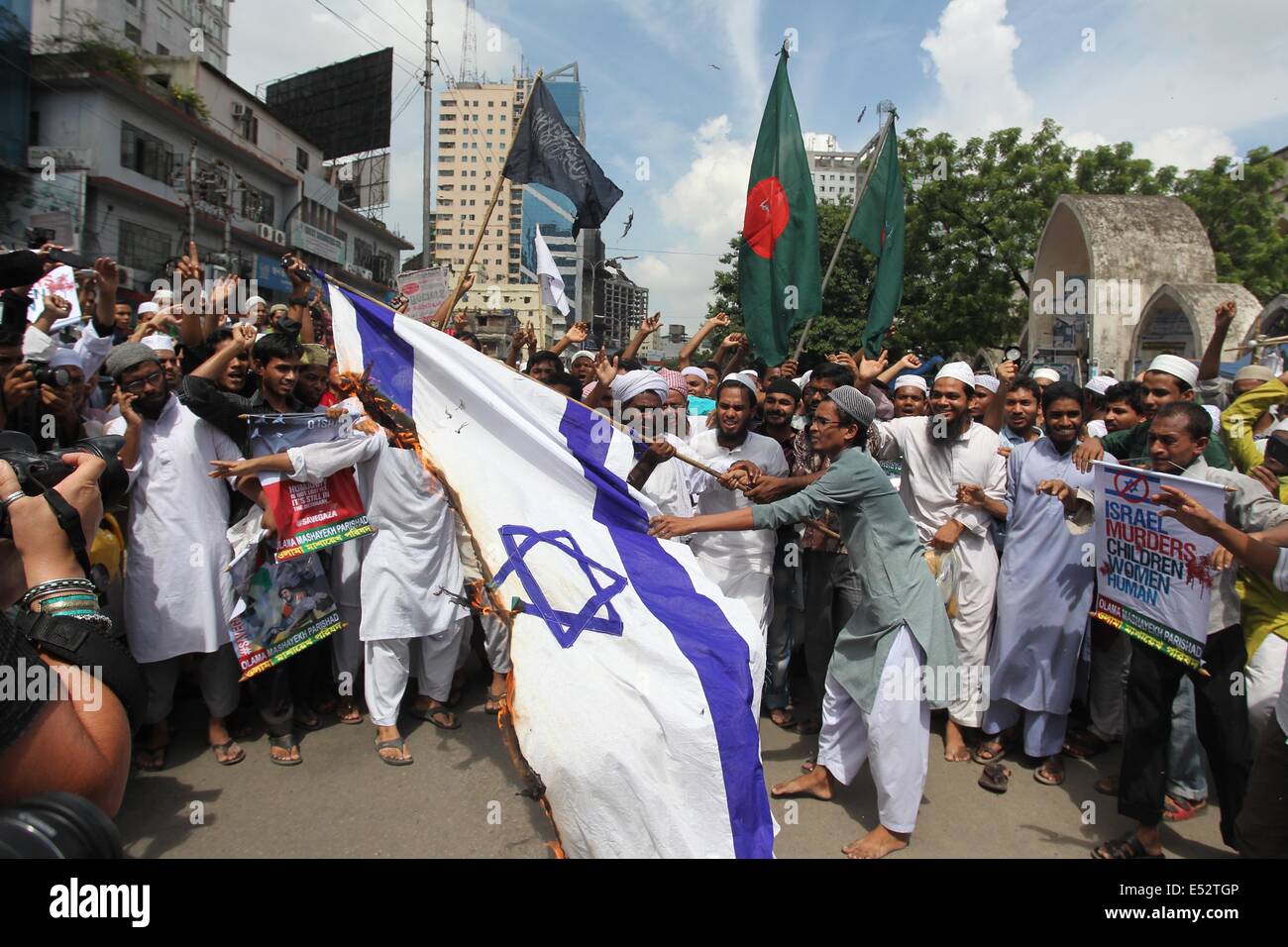 Dhaka, Bangladesh. 18th July, 2014. Bangladeshis burn an Israeli flag ...