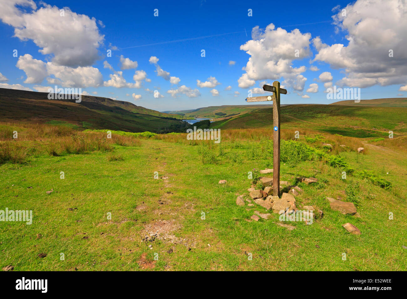 Trans Pennine Trail waymarker and distant Woodhead Reservoir in ...