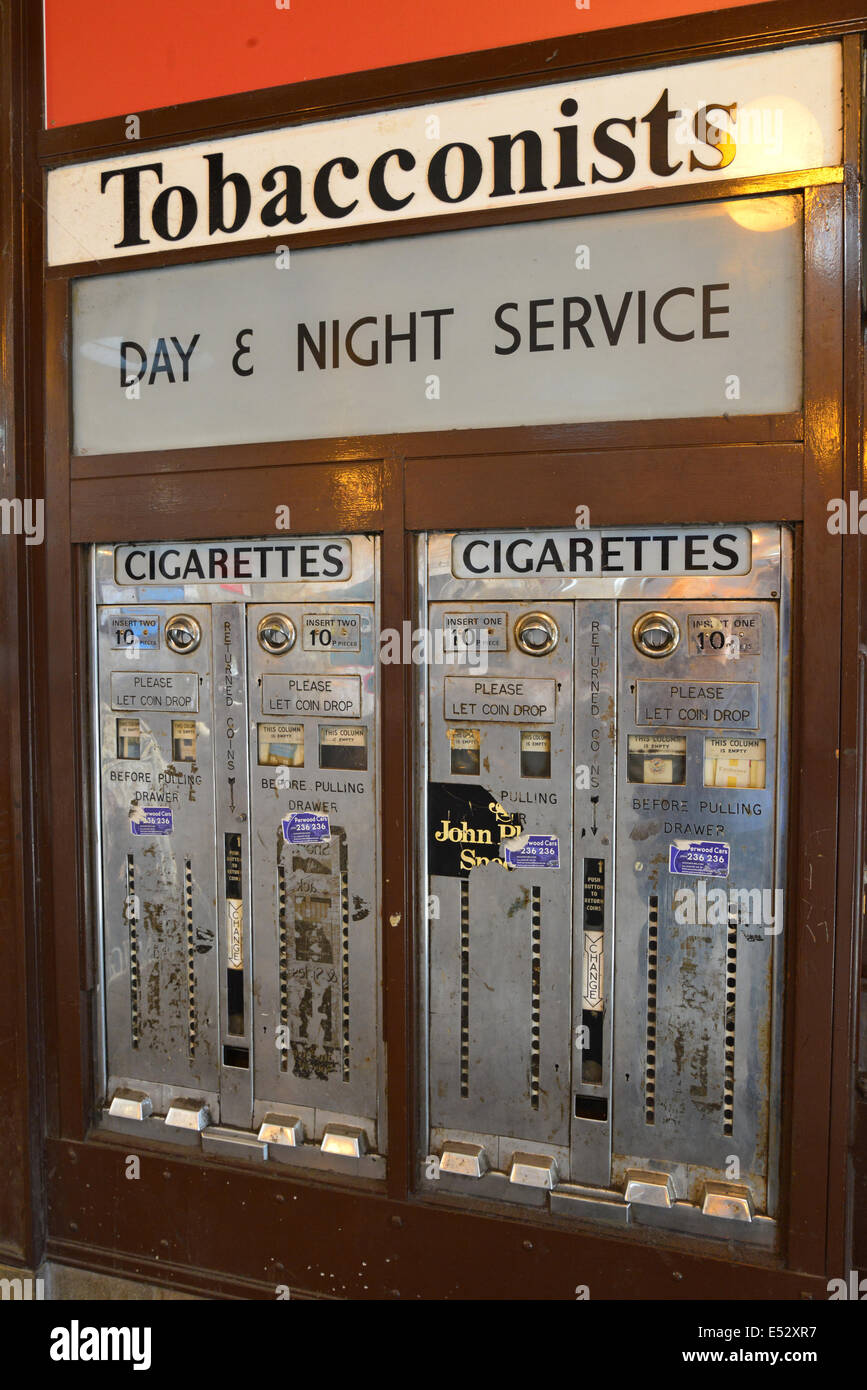 Vintage cigarette machine on wall of Underground Station, Uxbridge ...