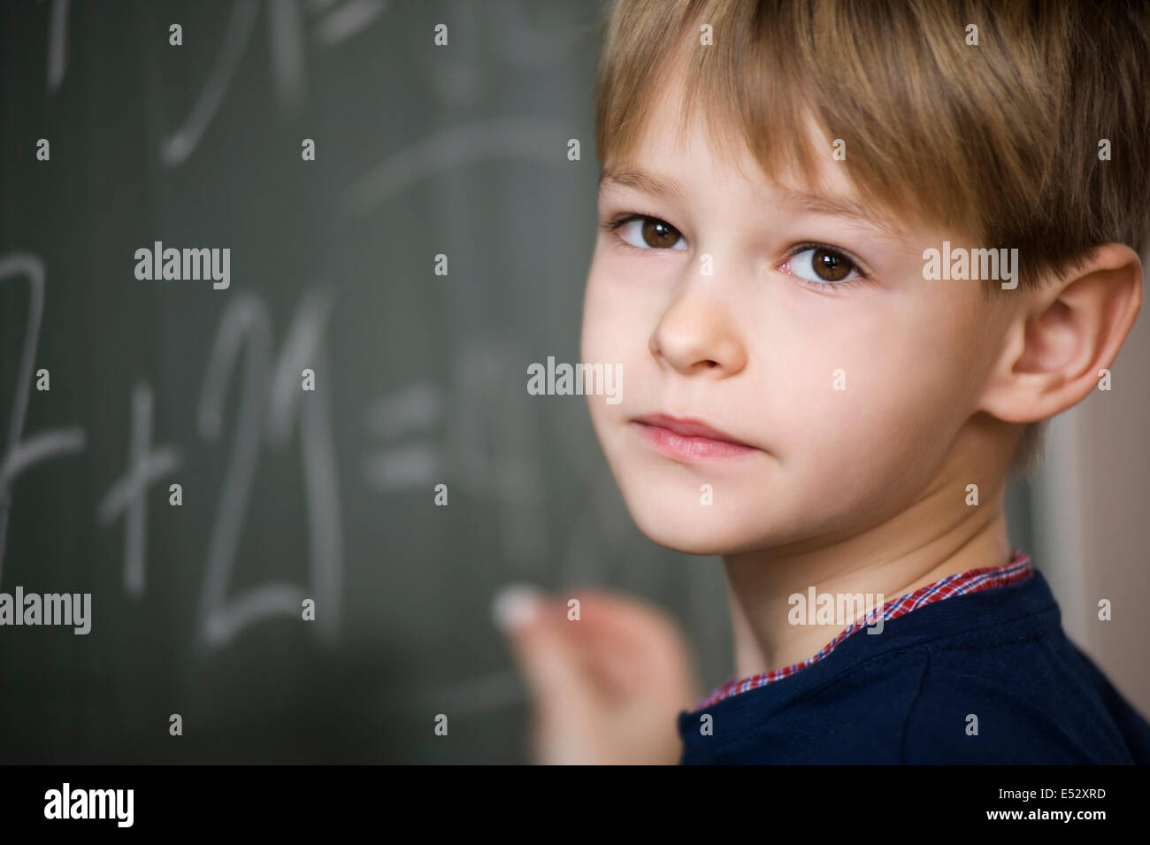 school boy in front of school board Stock Photo - Alamy