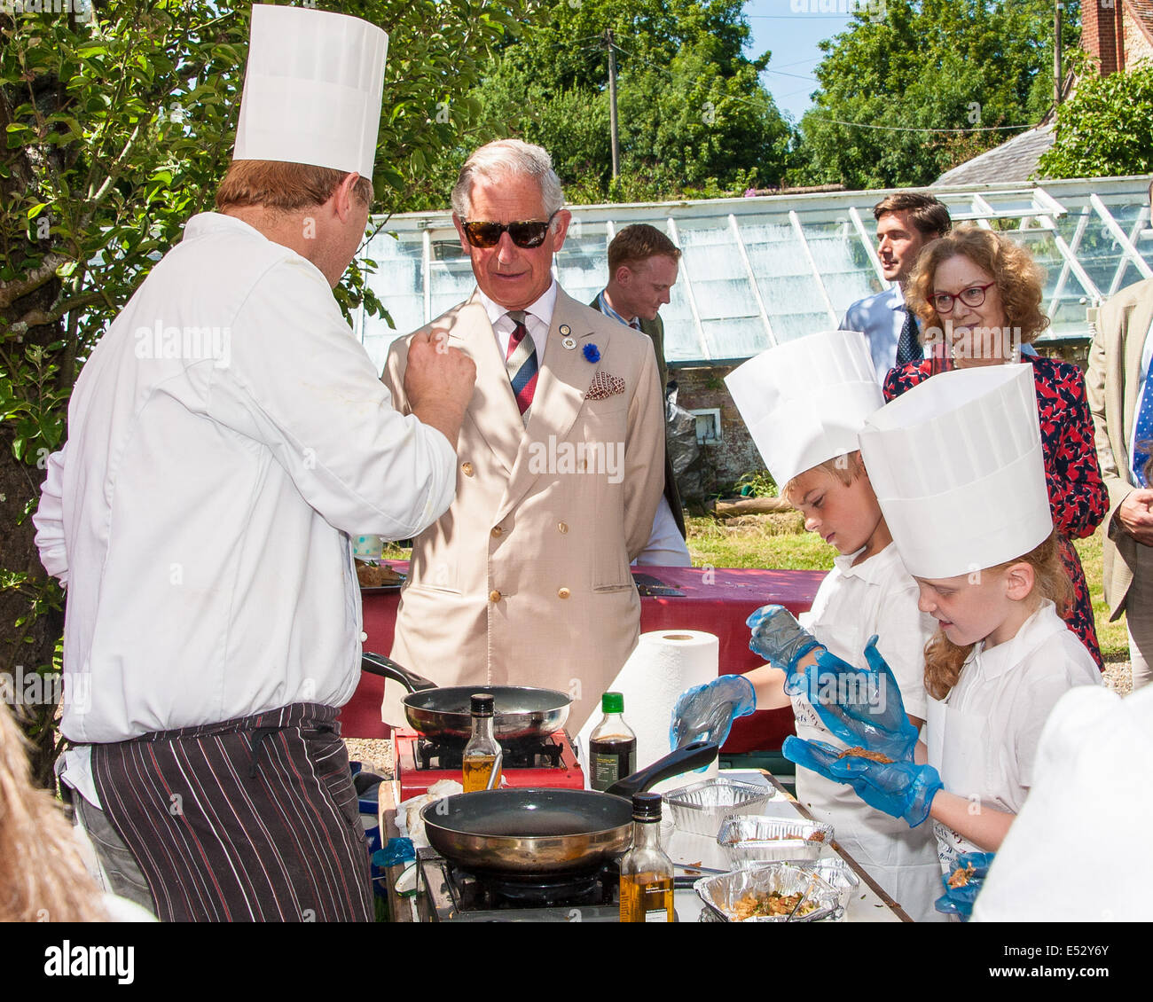 Wiston, West Sussex, UK. 18th July, 2014. HRH Prince Charles chats with ...