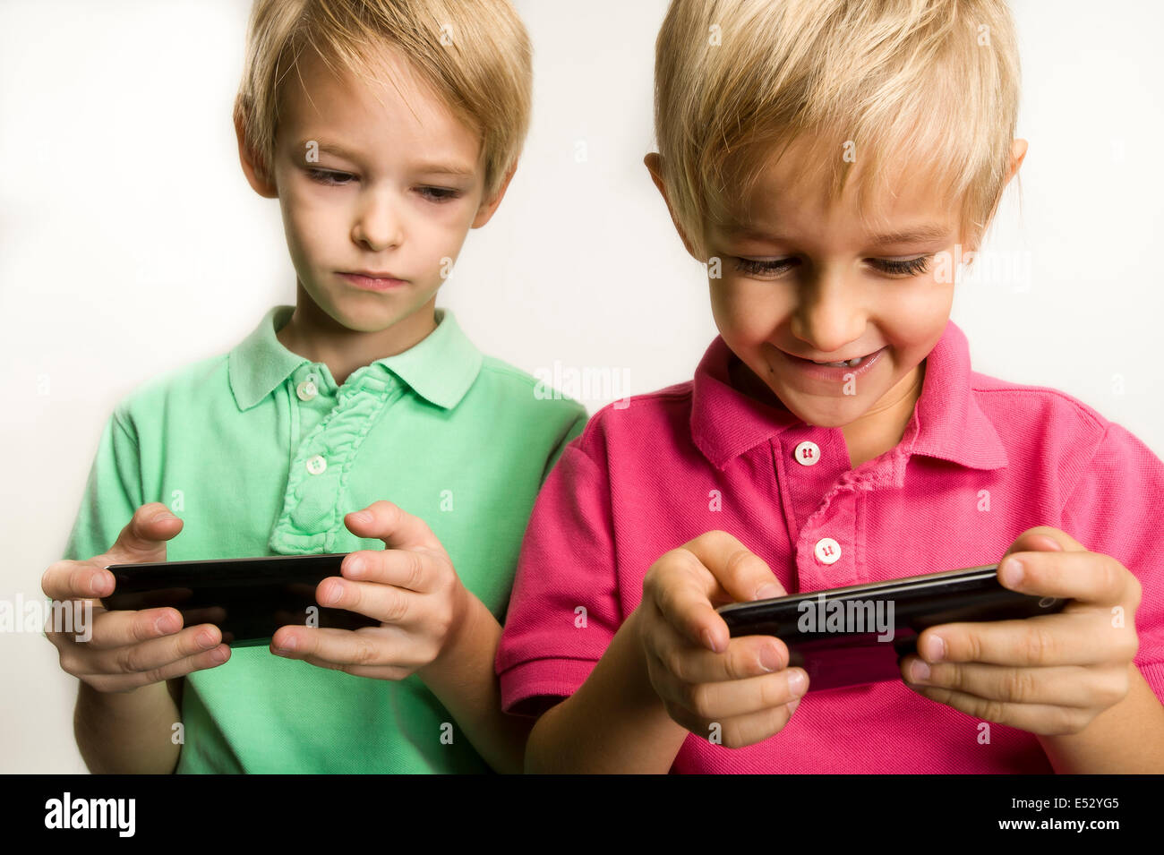 boys with smart phones Stock Photo - Alamy