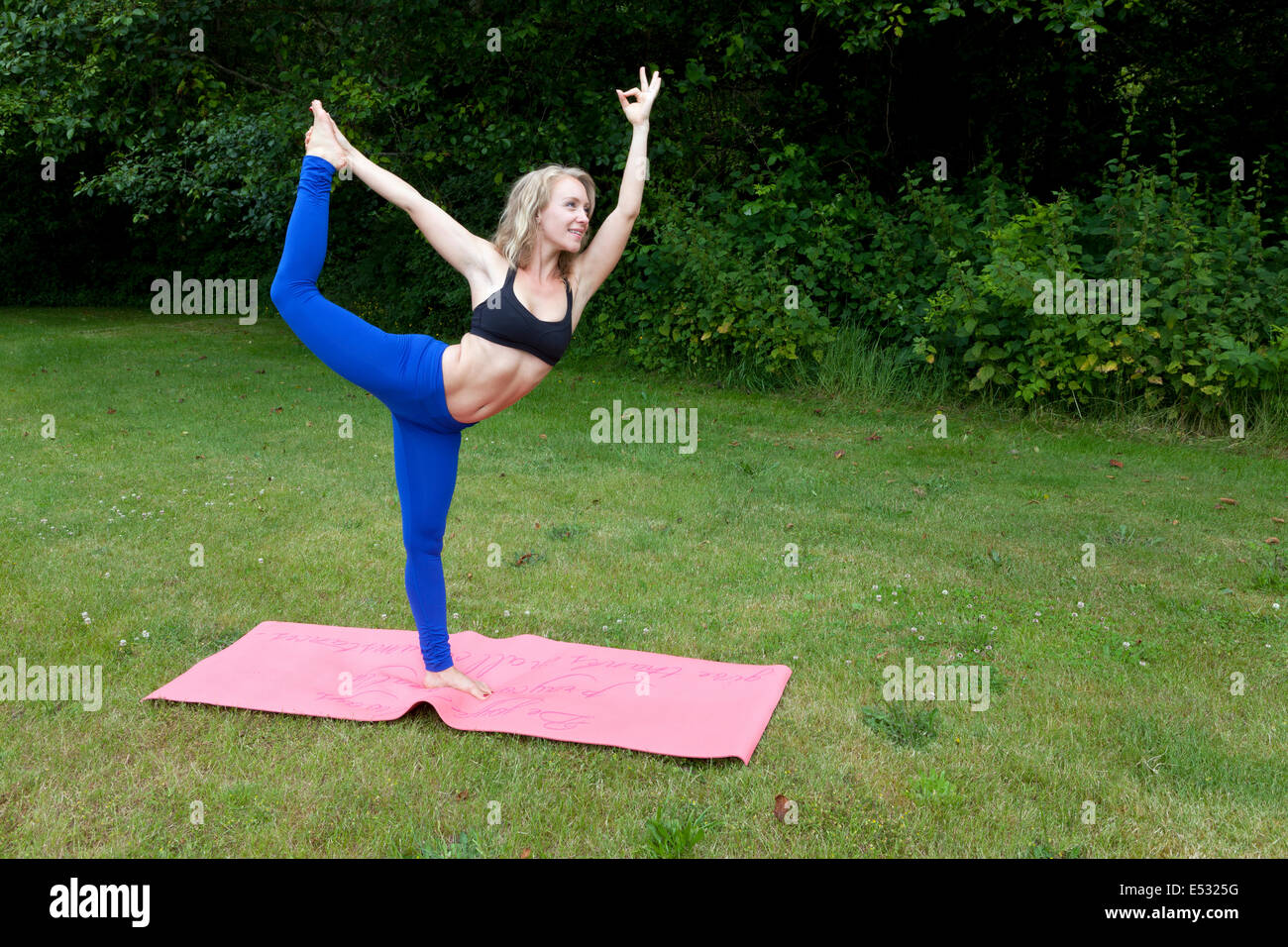 WASHINGTON - Yoga instructor Carly Hayden warming up Stock Photo - Alamy