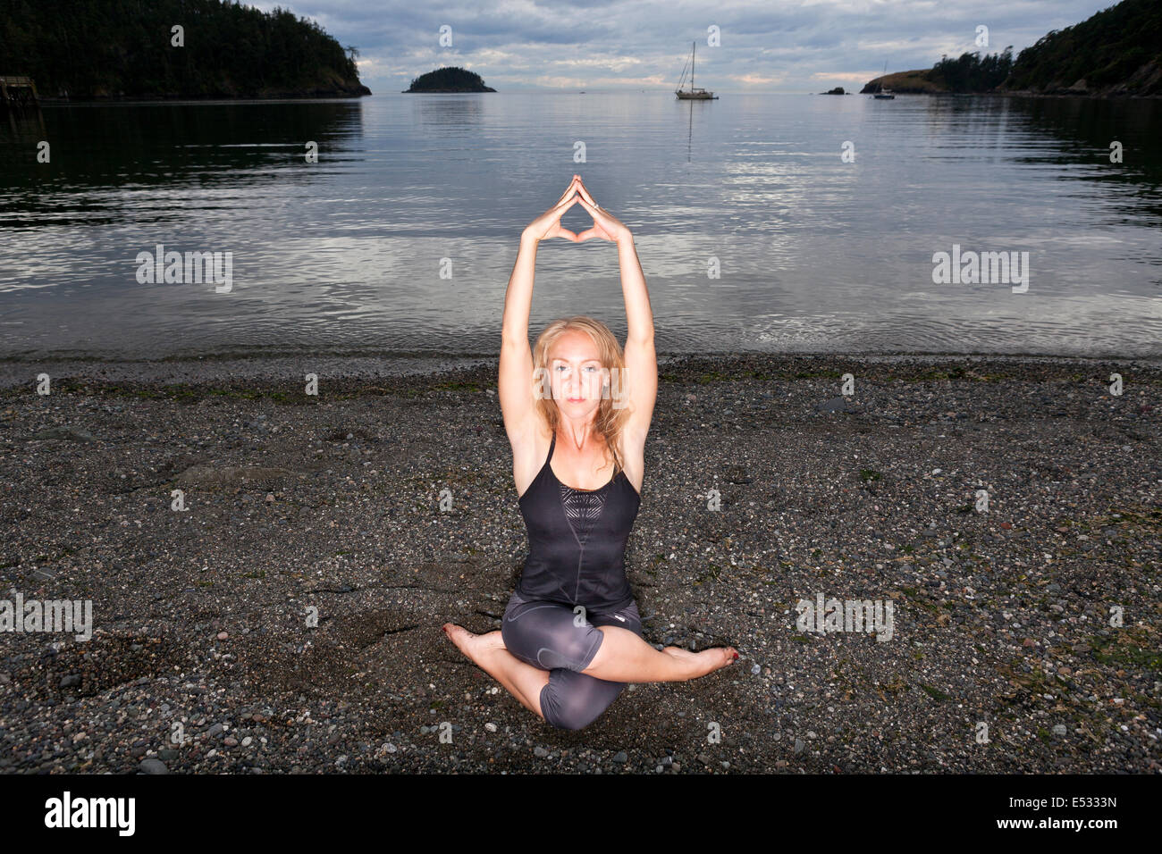 WASHINGTON - Yoga instructor Carly Hayden warming up Stock Photo - Alamy