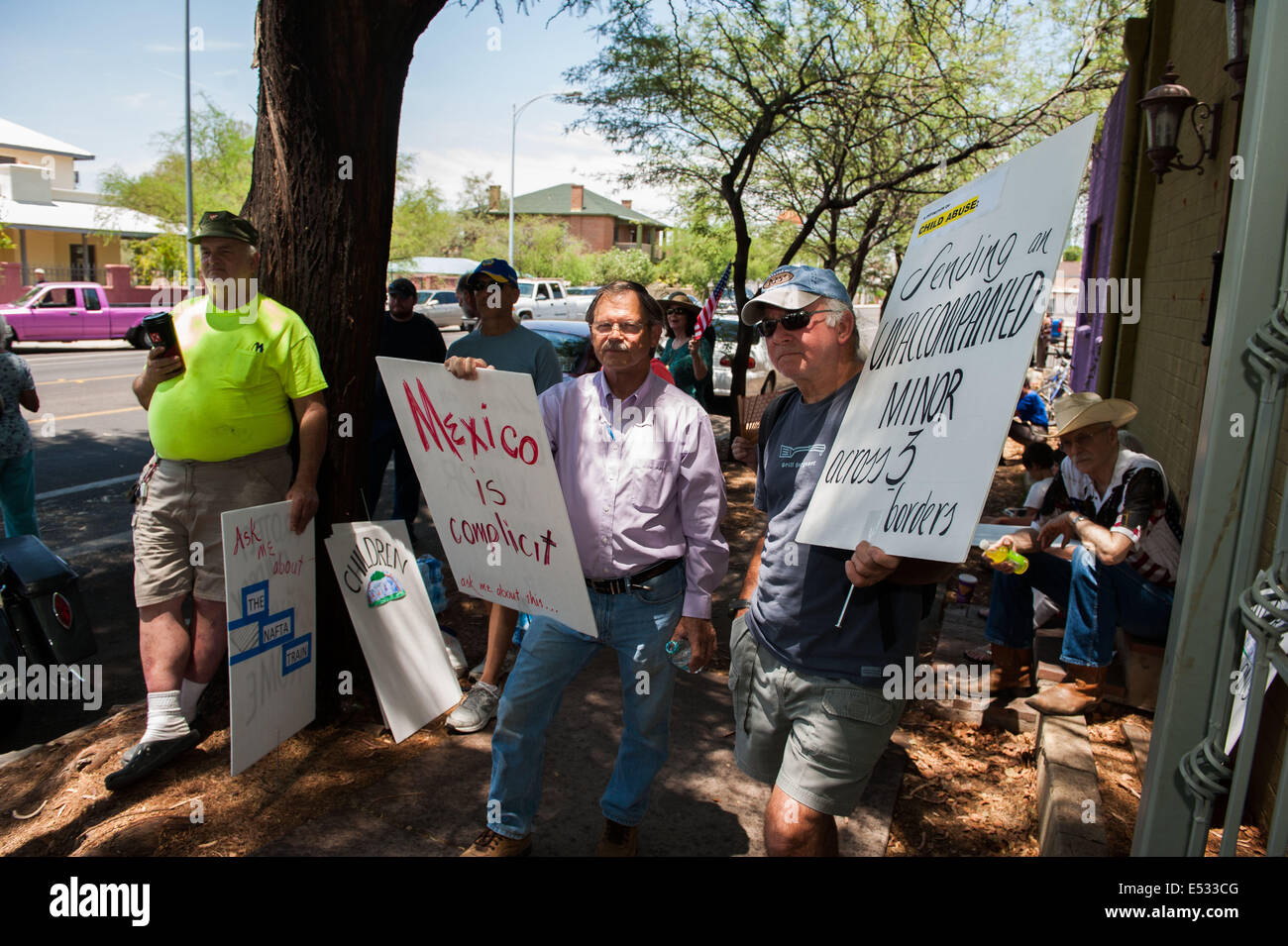 Tucson, Arizona, USA. 18th July, 2014. Appoximately 50 protestors, some ...
