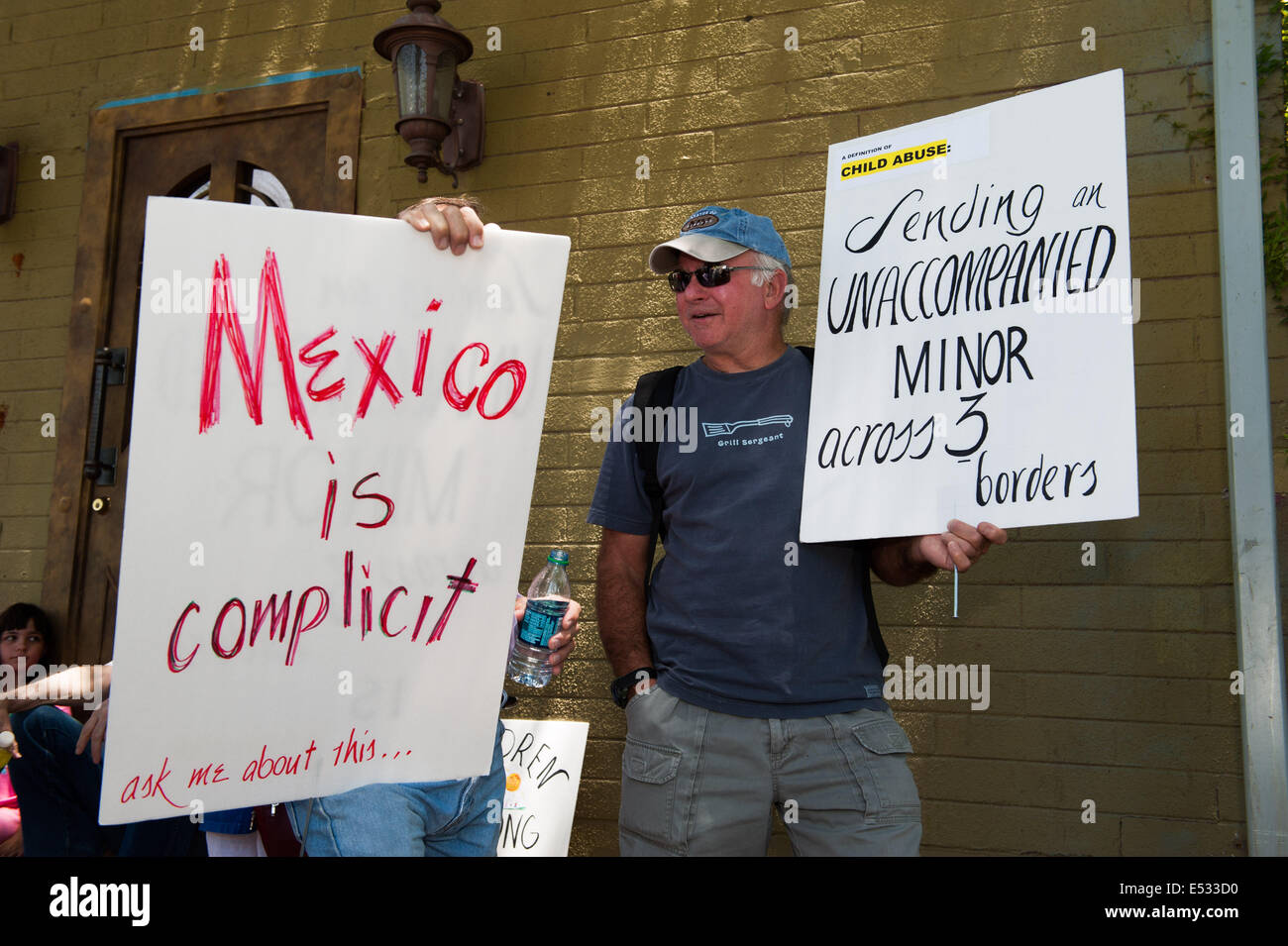 Tucson, Arizona, USA. 18th July, 2014. Appoximately 50 protestors, some ...