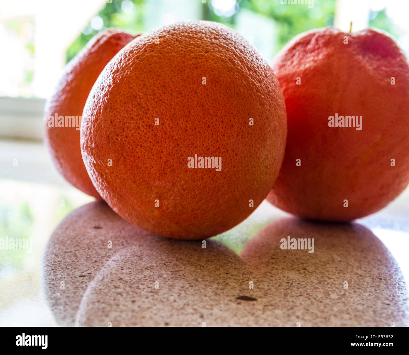 Very Large Red Grapefruit on a Kitchen counter Stock Photo - Alamy