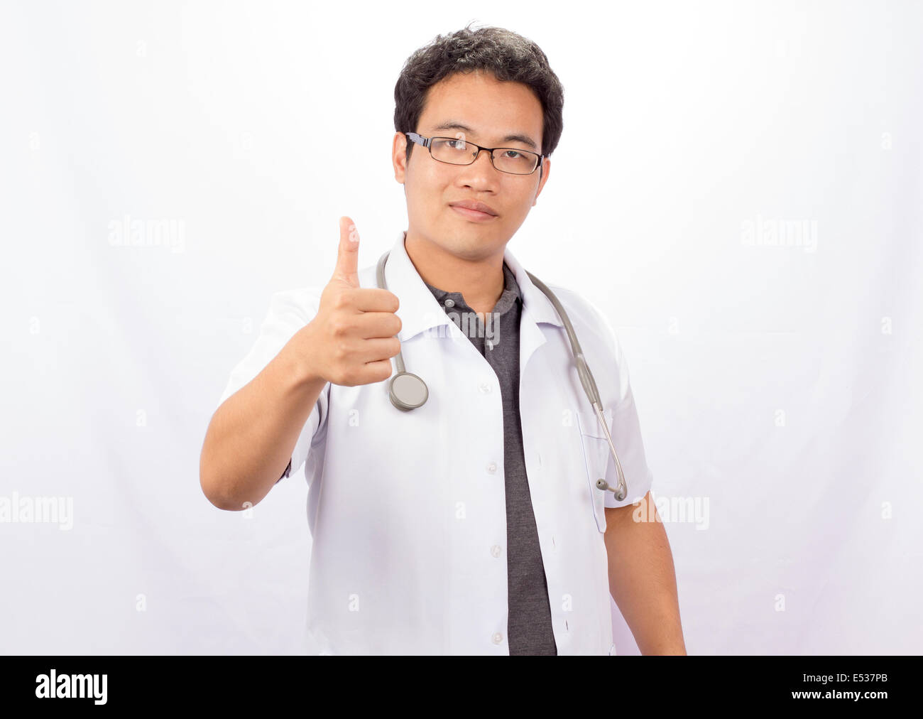 Happy doctor at the doctor's office Stock Photo - Alamy