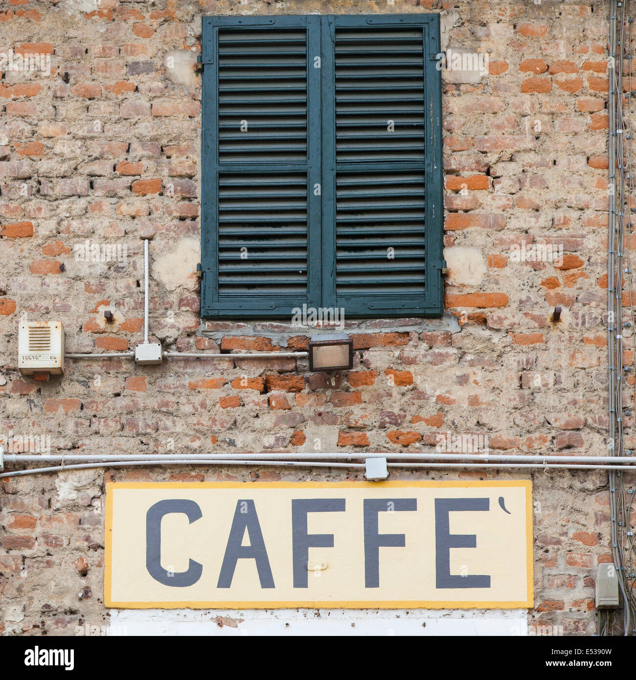 Tuscany, Italy. Old Caffè sign under a traditional Italian window Stock ...